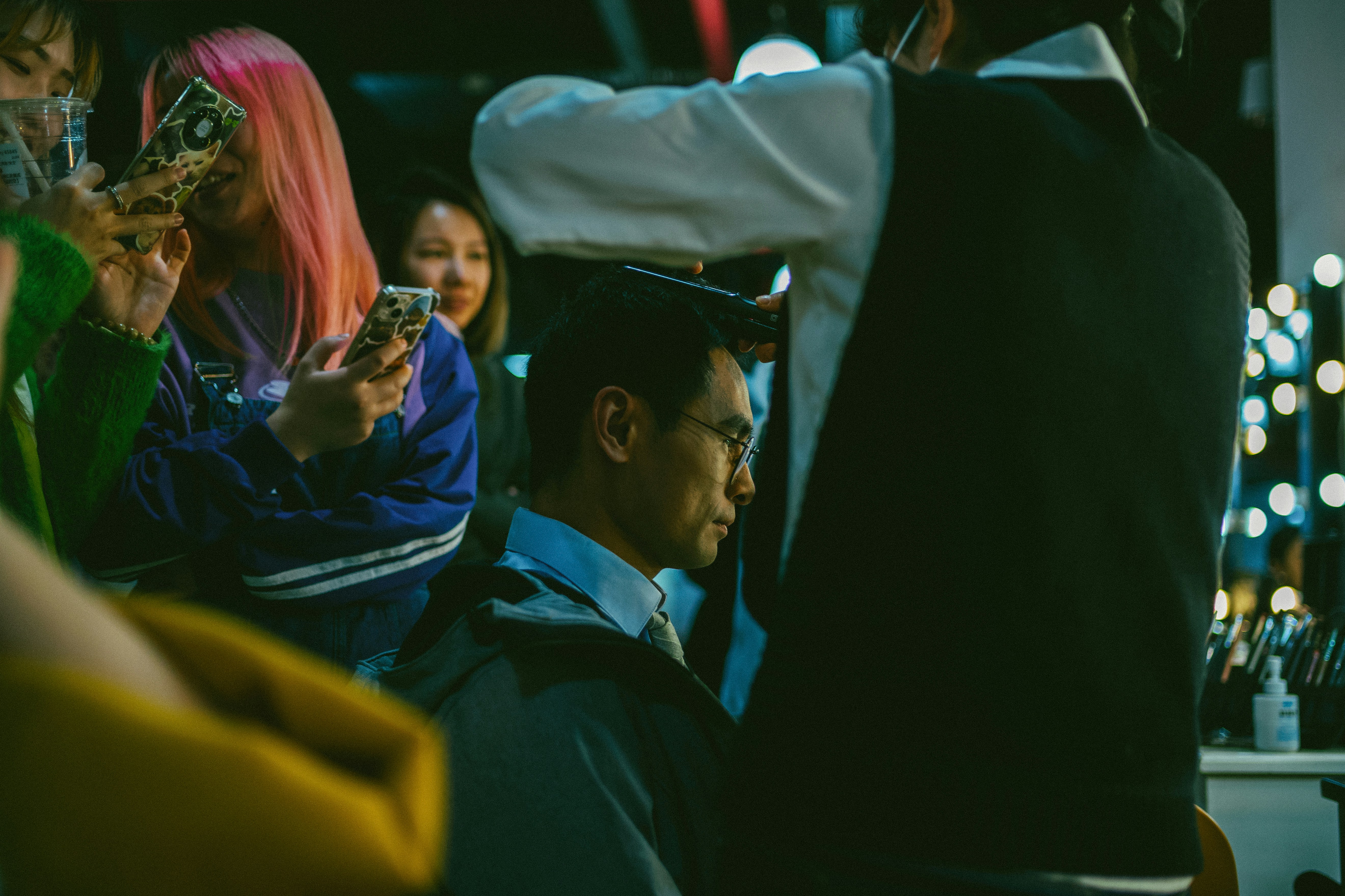 A group of people standing around each other photo – Free Person Image ...