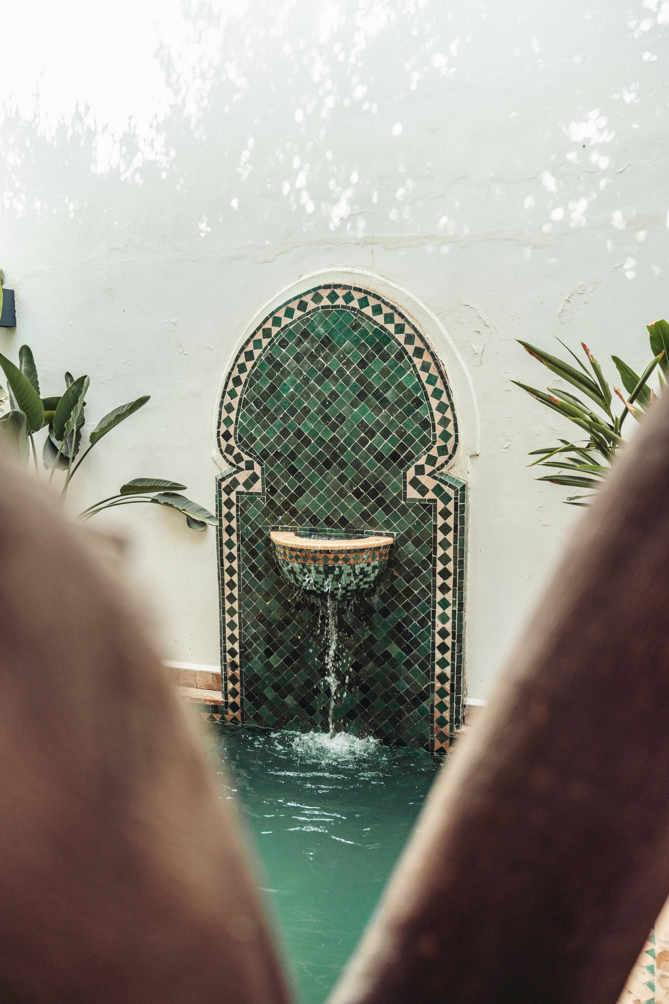 Green Mosaic Arch Fountain: Framed Oasis in a Quiet Courtyard
