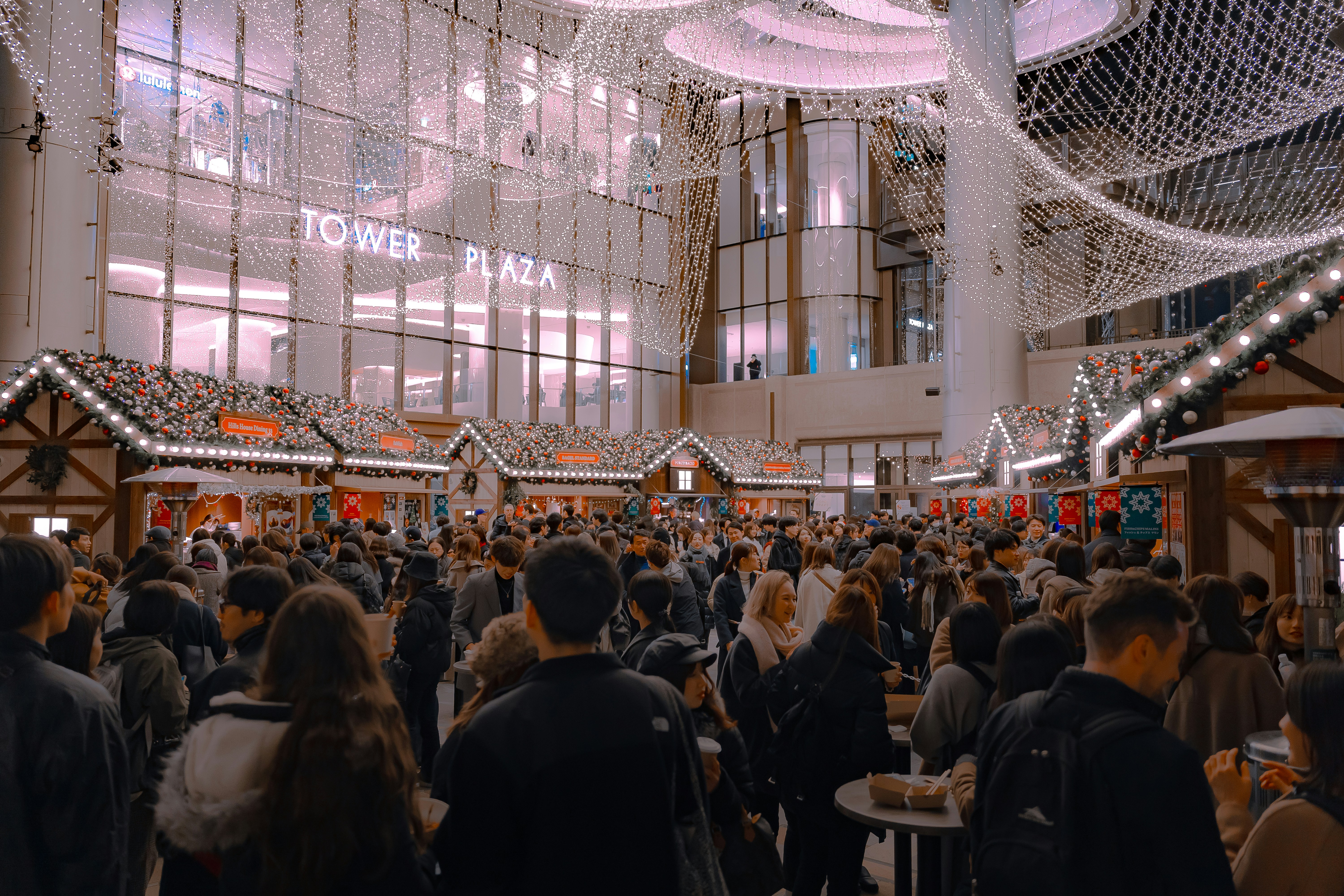 Tower Plaza Holiday Market: Garlands, Glow, and a Crowded Concourse