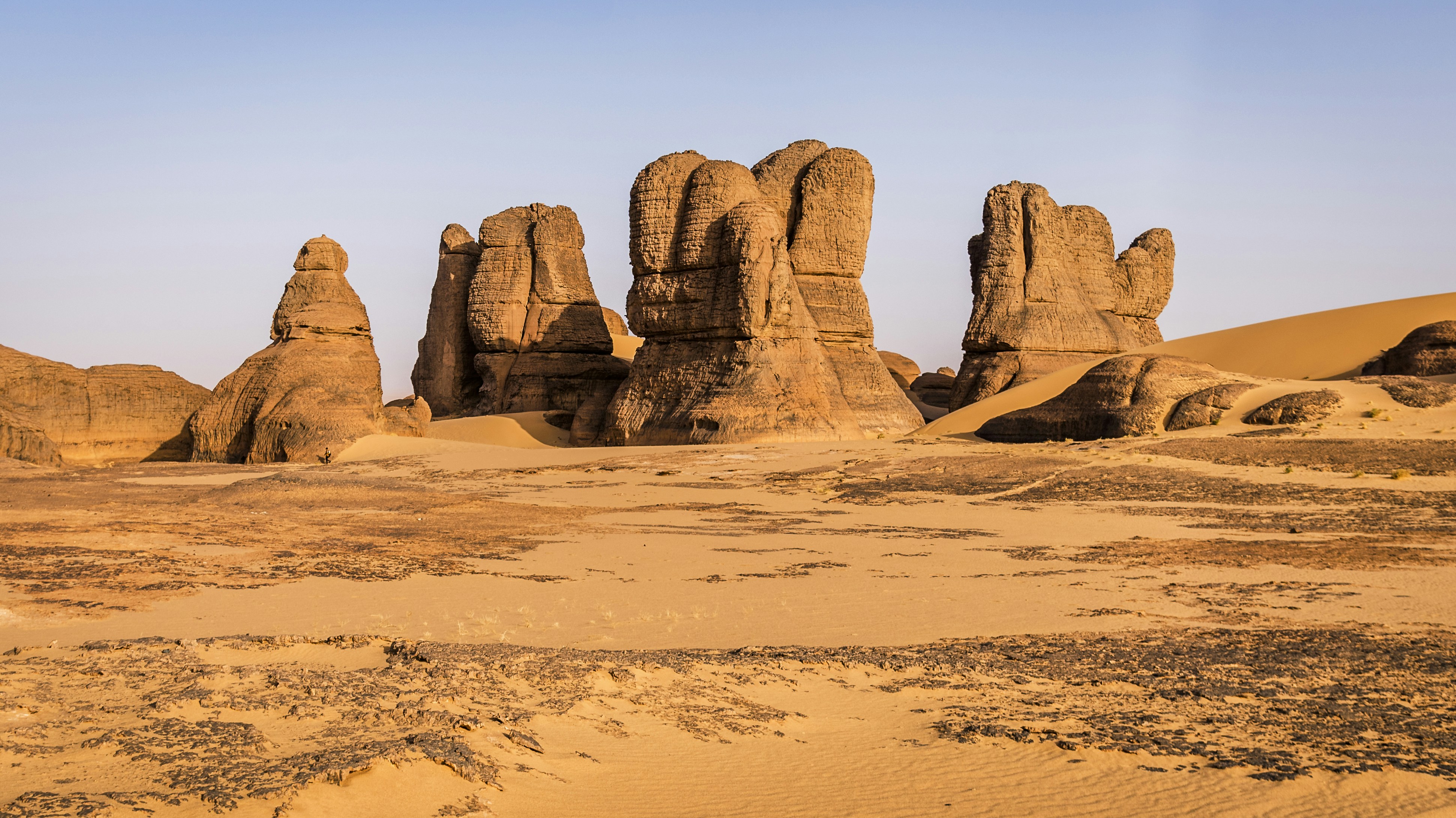 A group of rock formations in the desert photo – Free Desert Image on ...