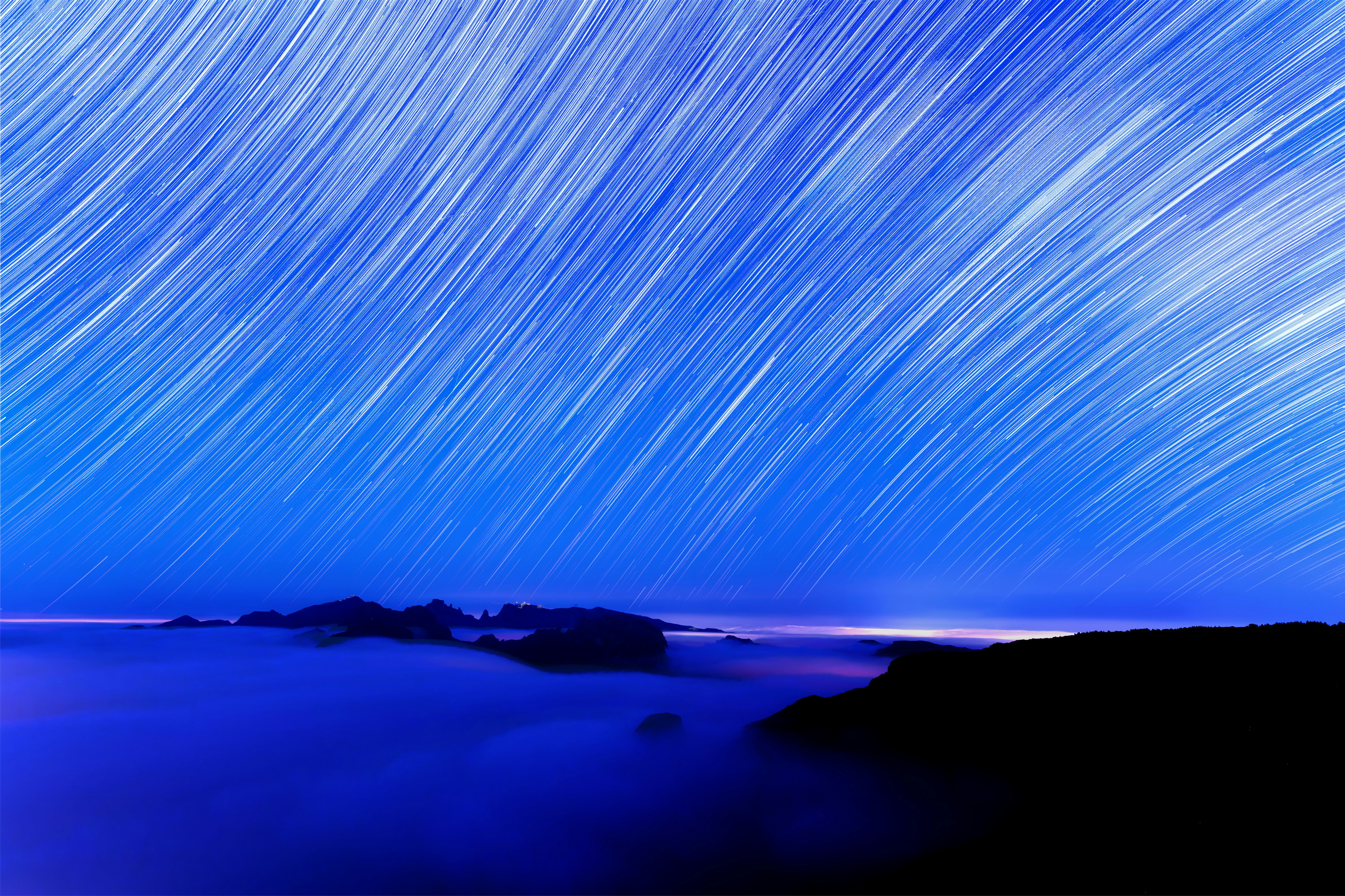 The night sky with stars moving across the sky photo – Free Wallpapers ...