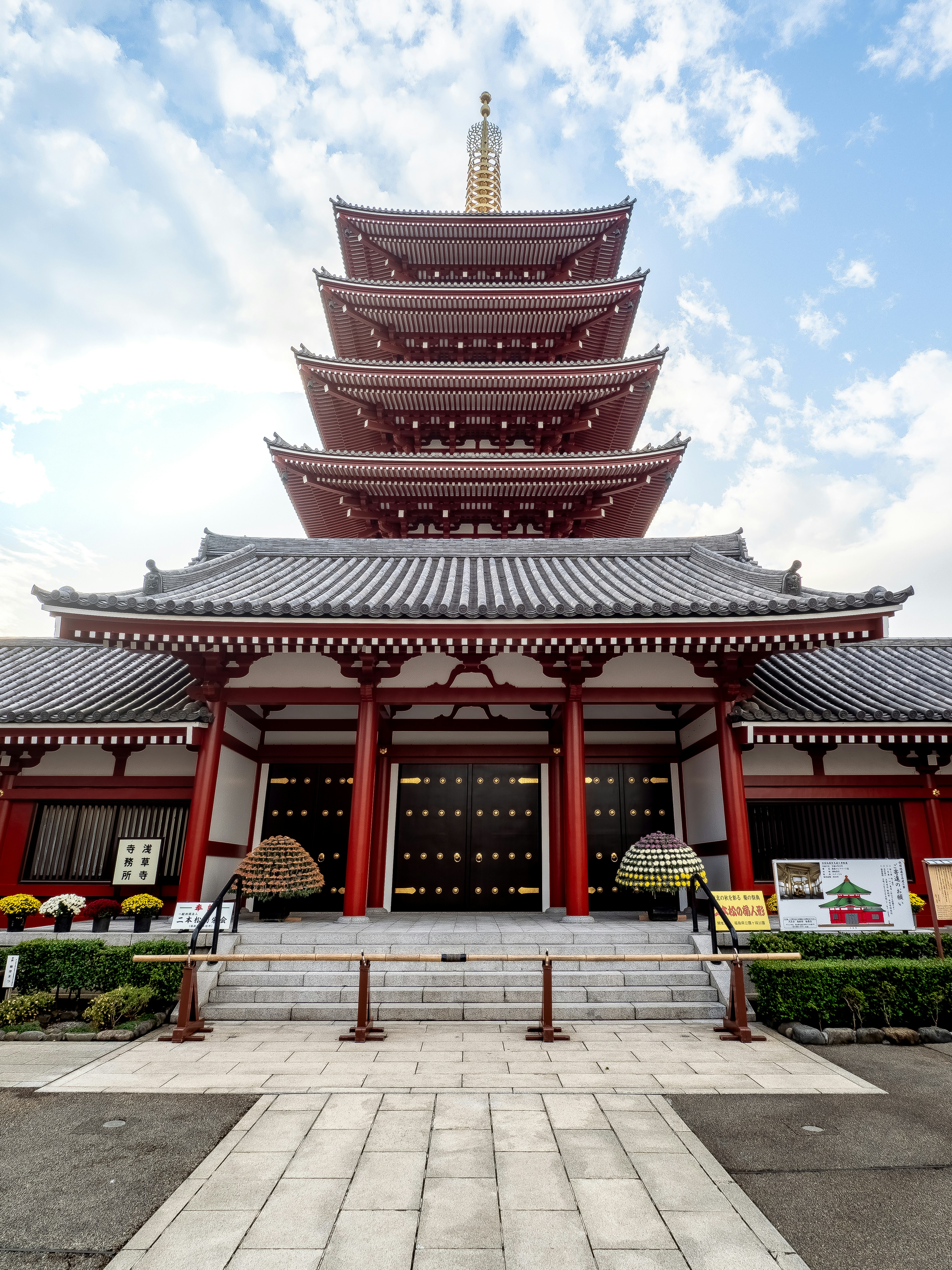 A tall red building with a tall tower on top of it photo – Free Tokyo ...