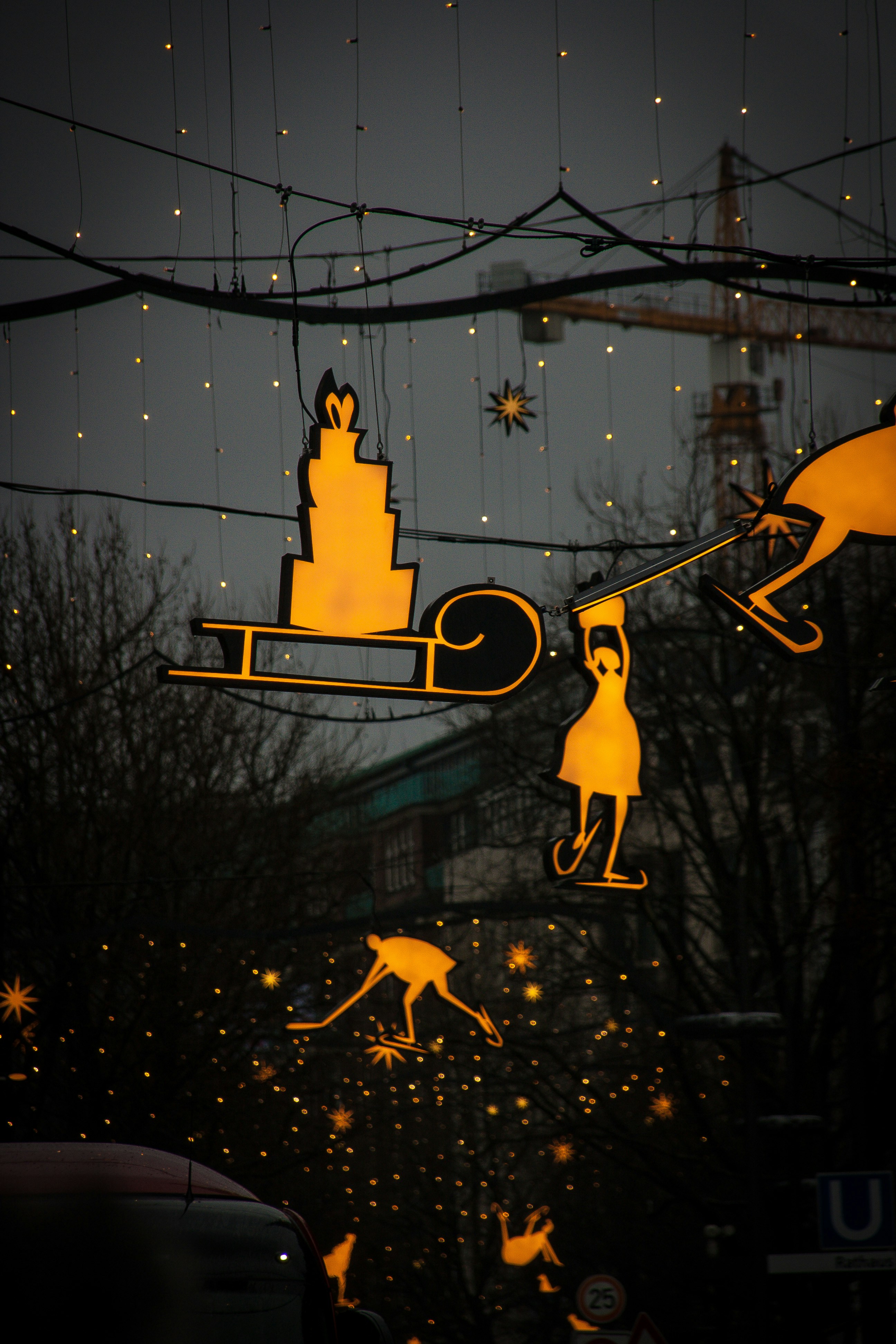 Amber Window Silhouettes: Festive Light Art on Glass