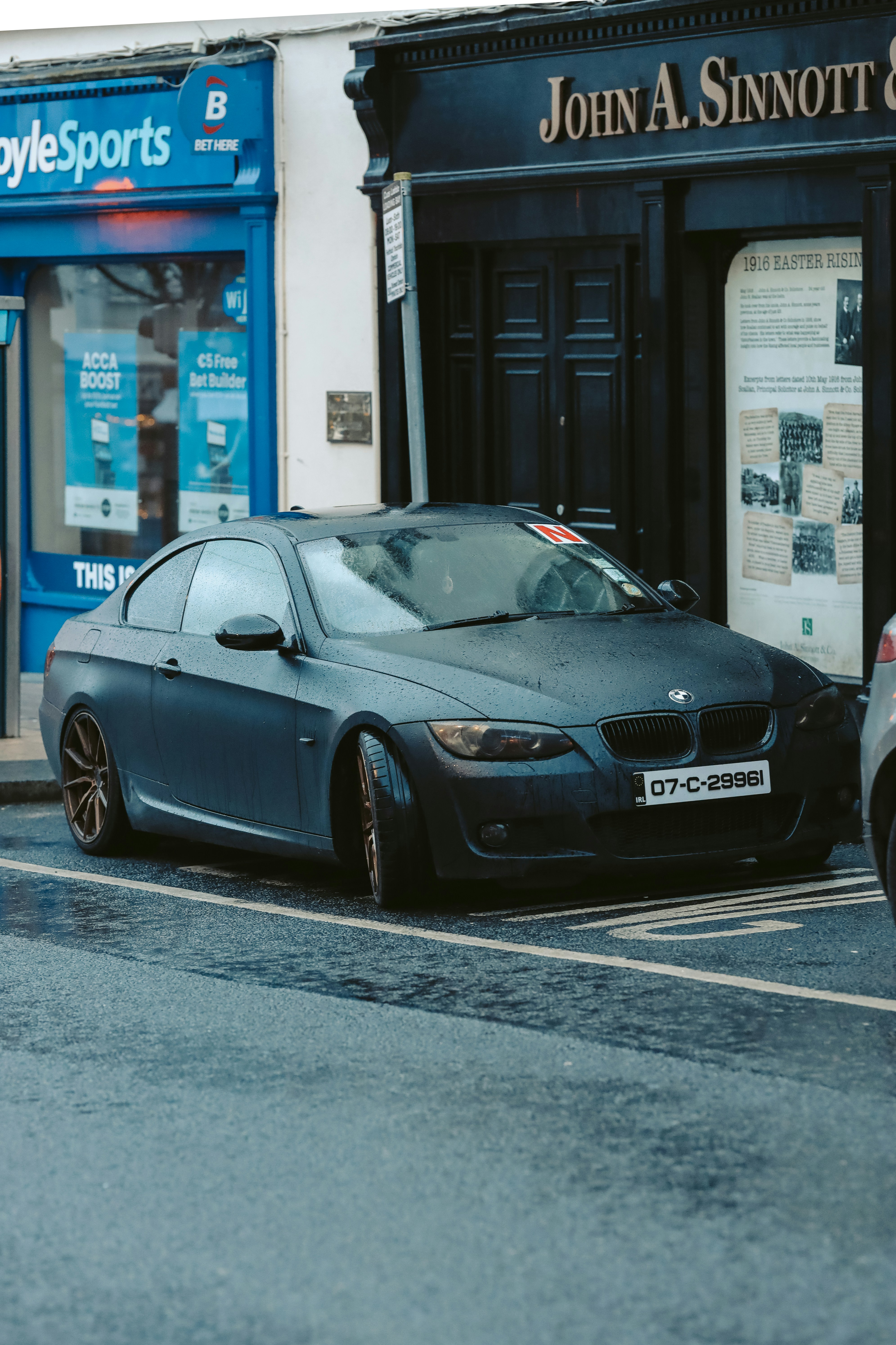 Matte Blue BMW Holds Court on a Rain-Washed Georgian Street
