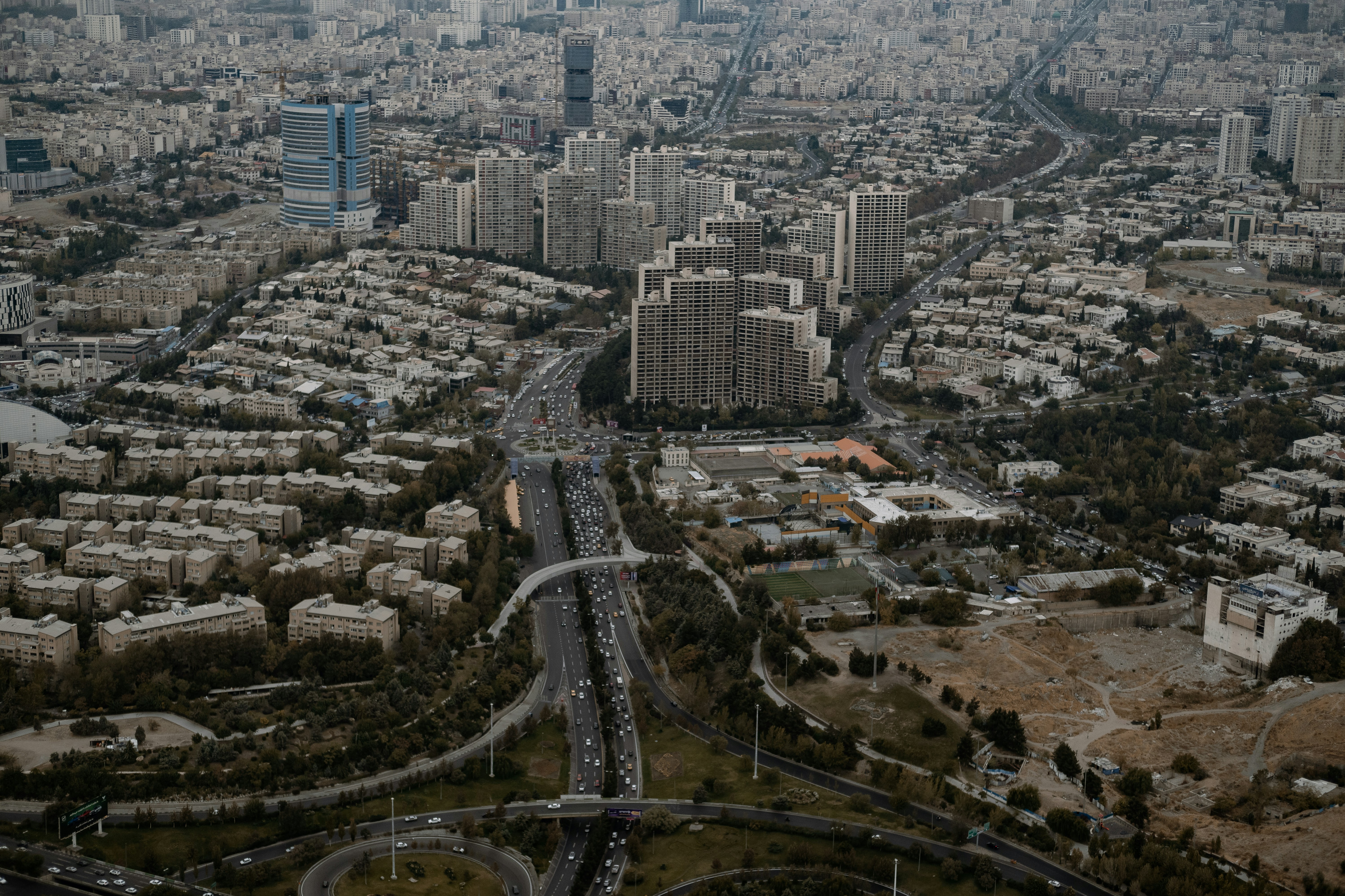 An aerial view of a city with lots of tall buildings photo – Free ...