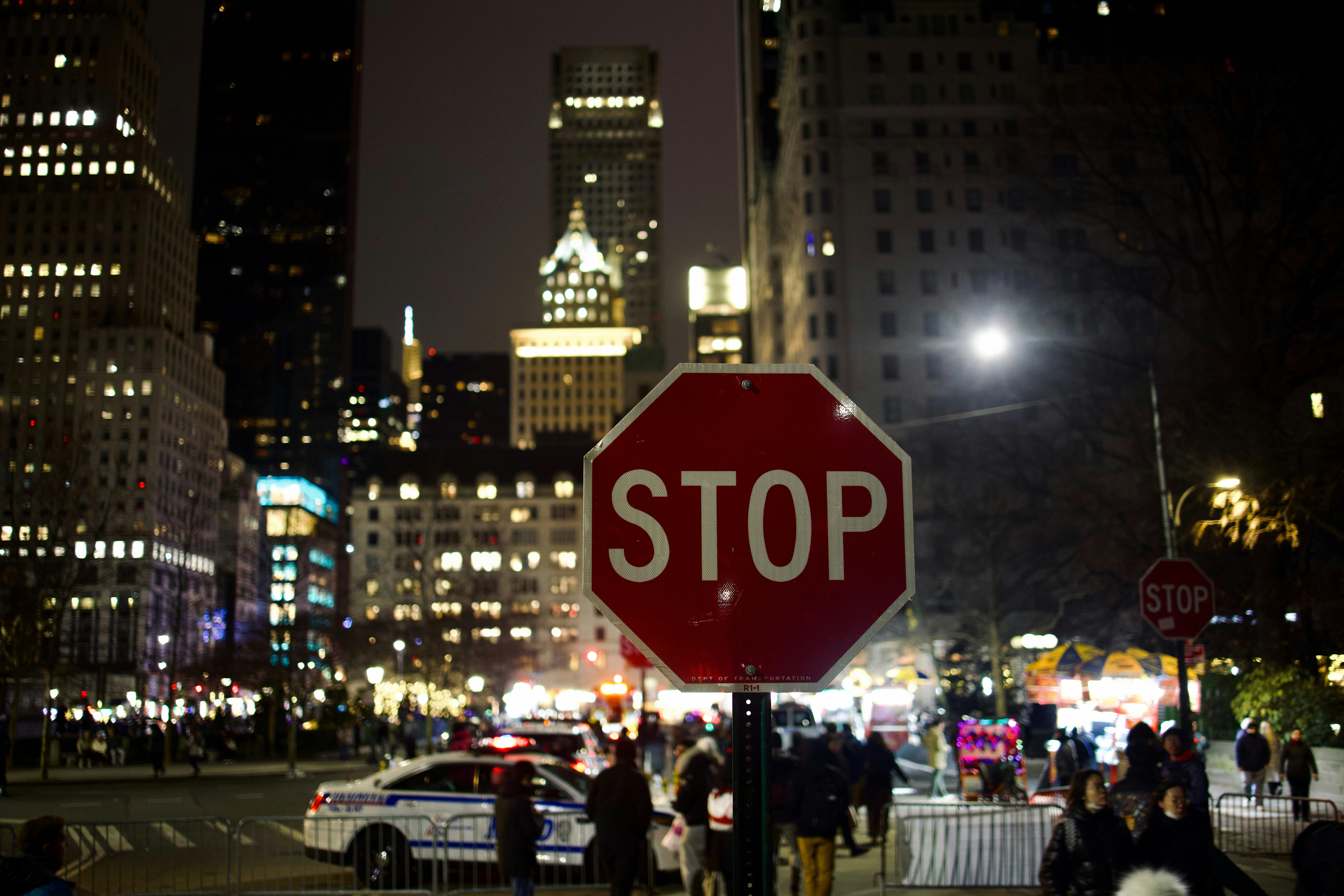 City Pulse: Stop Sign Amidst Urban NightlifeRosa Rafael