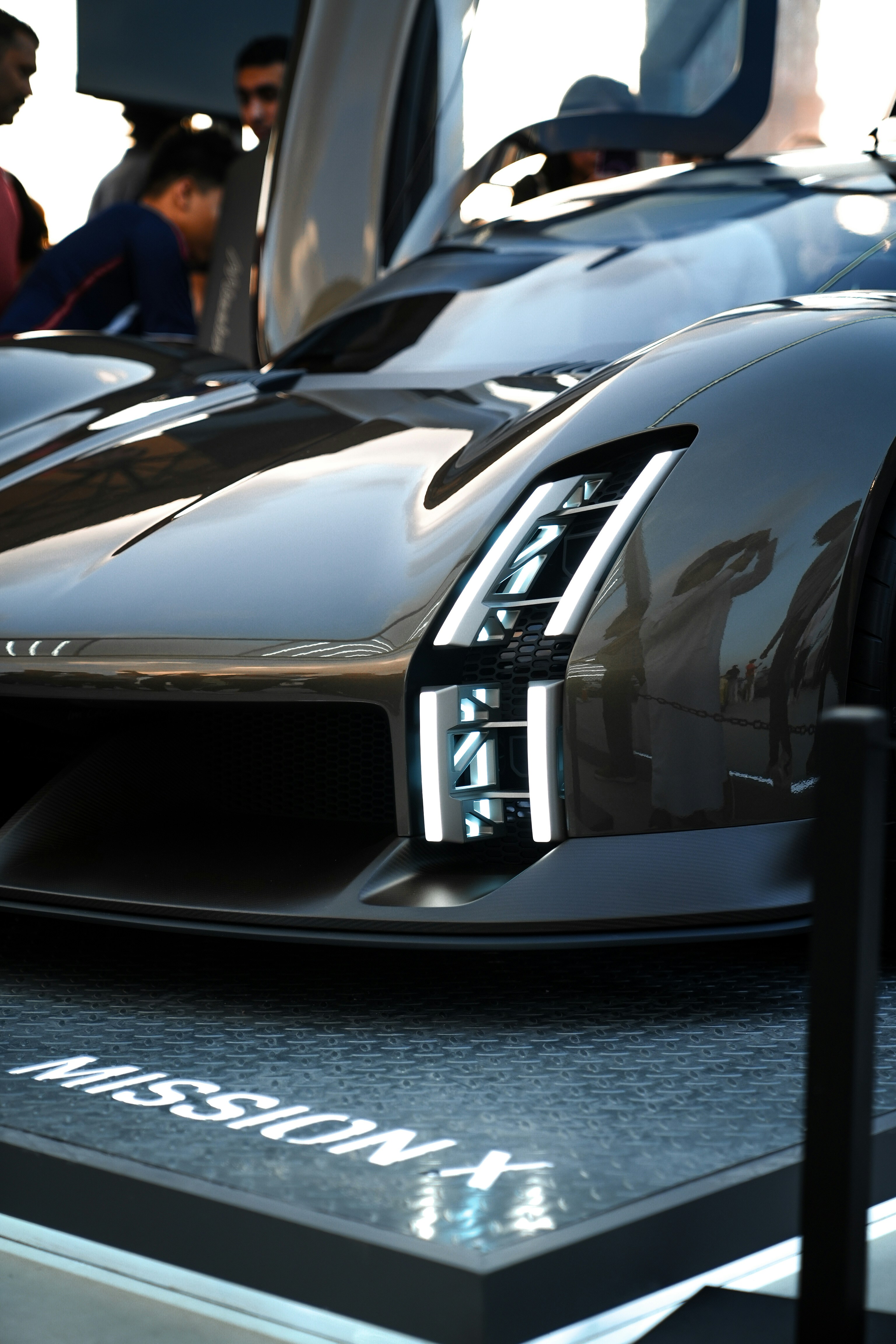 A close up of a sports car on display at a car show photo – Free Dubai ...