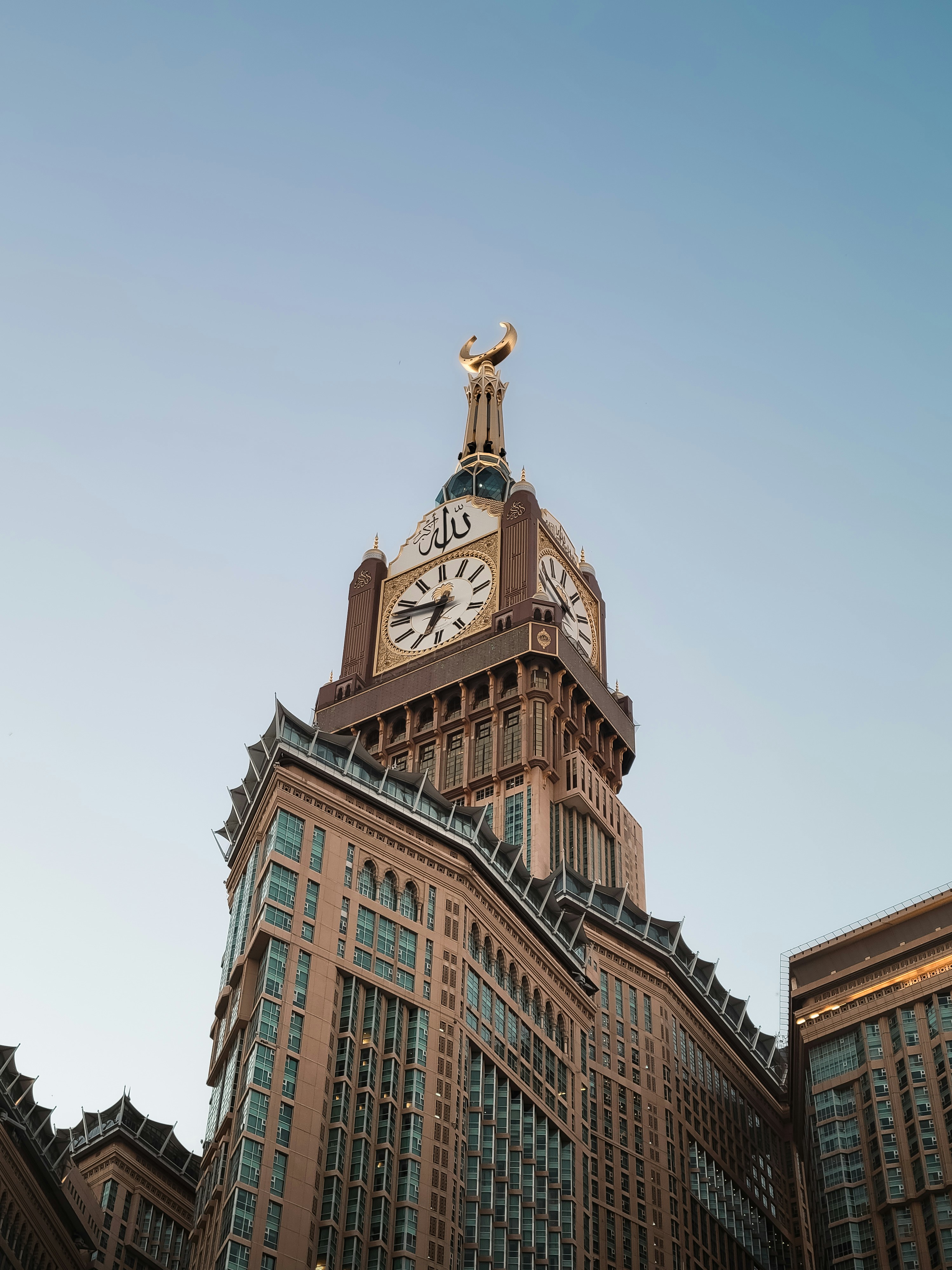 a tall building with a clock on the top of it