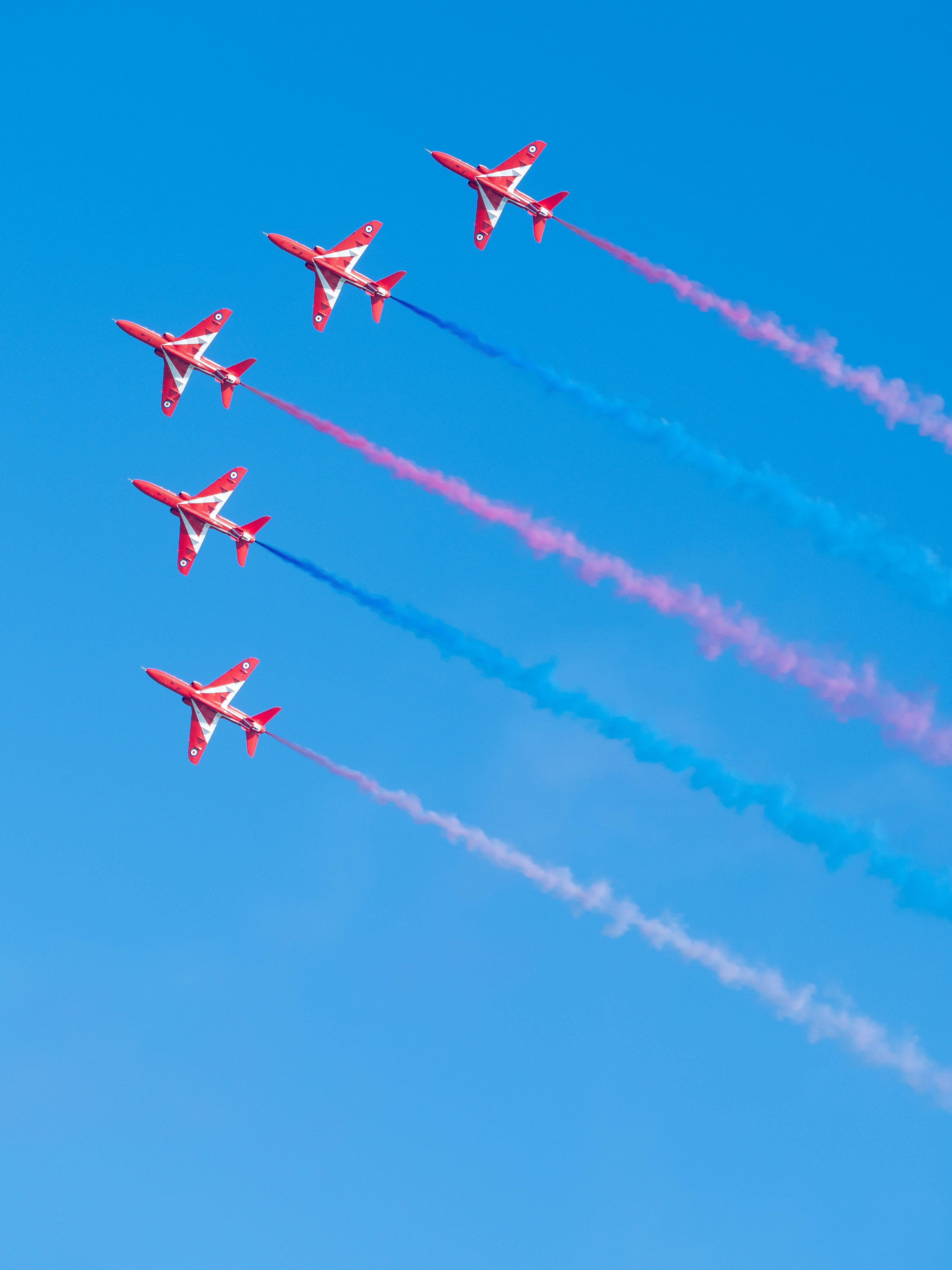 A group of red and white jets flying in formation photo – Free Airplane ...