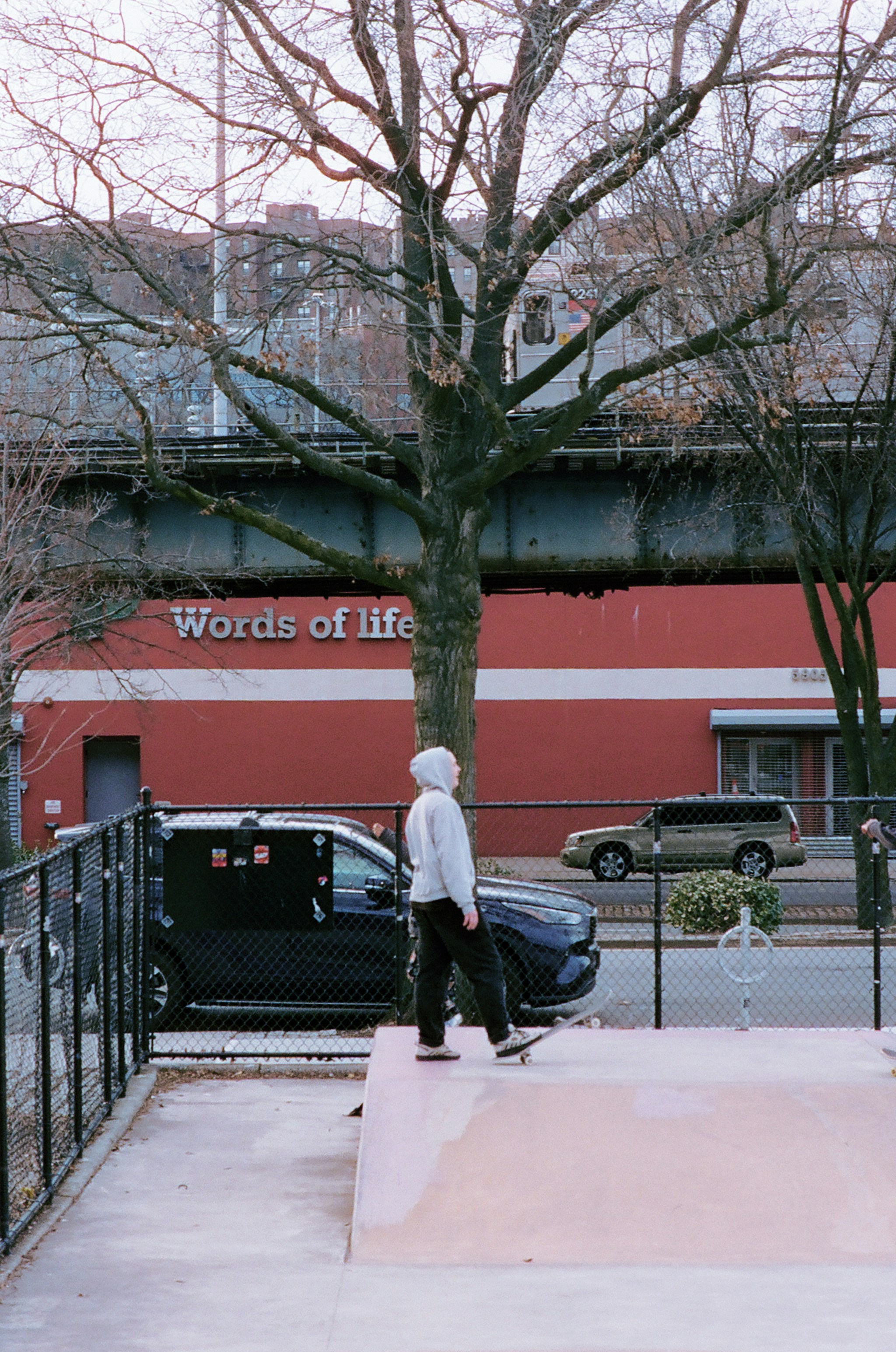 a man riding a skateboard on top of a ramp
