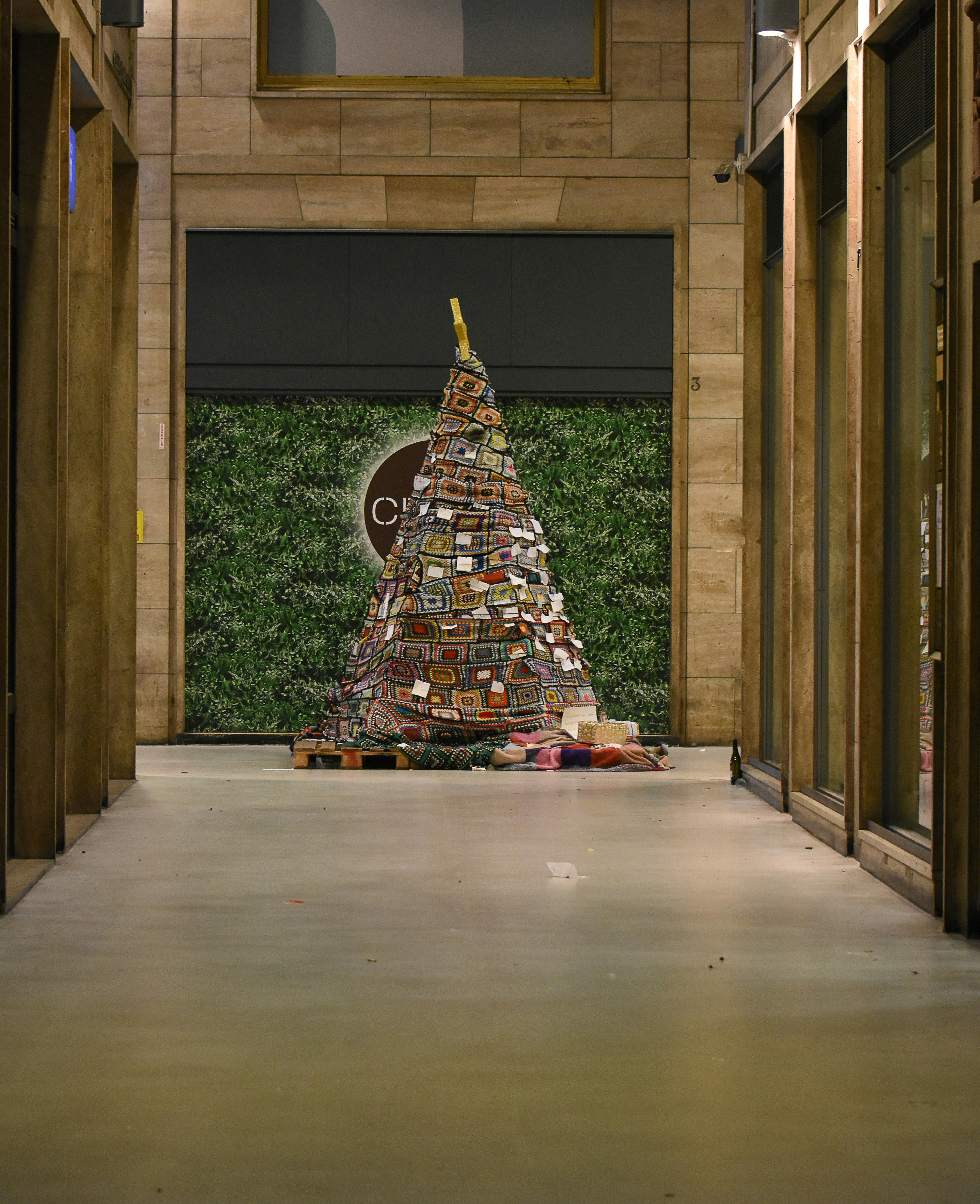A Patchwork Cone in a Marble Hall