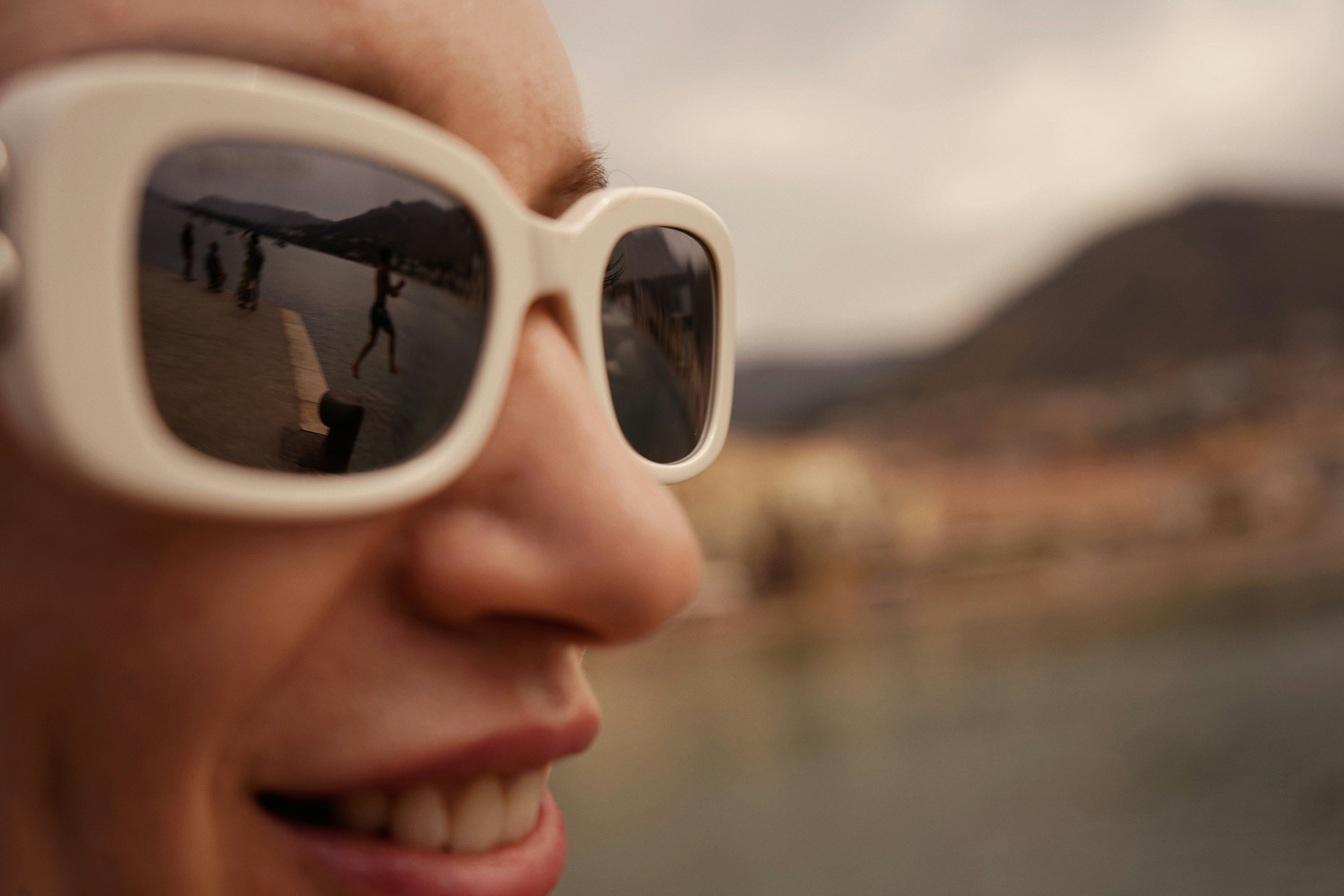Mirrored Moments: Reflections at the Edge of a Quiet Beach