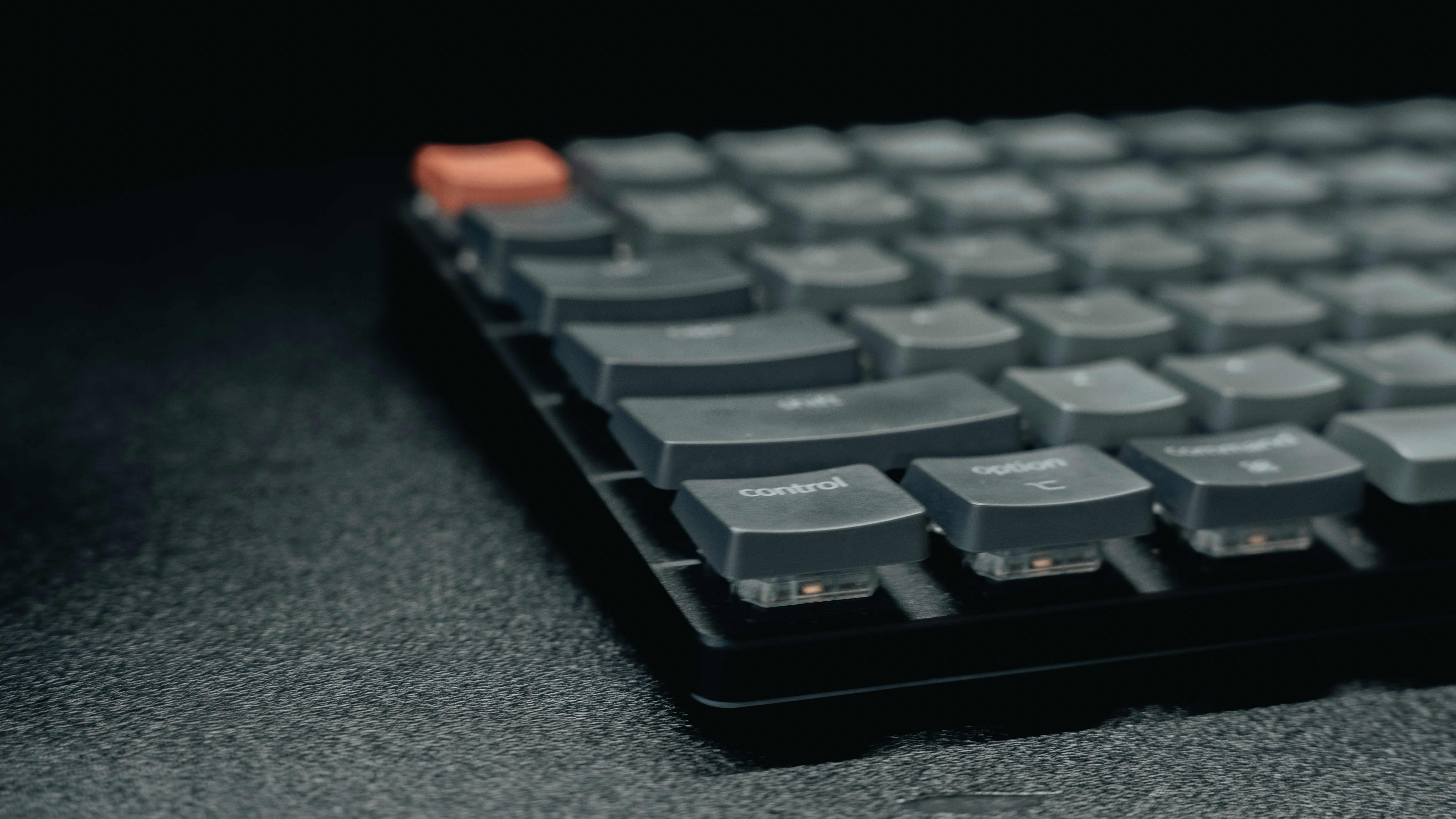 A close up of a computer keyboard on a table photo – Free Keybard Image ...