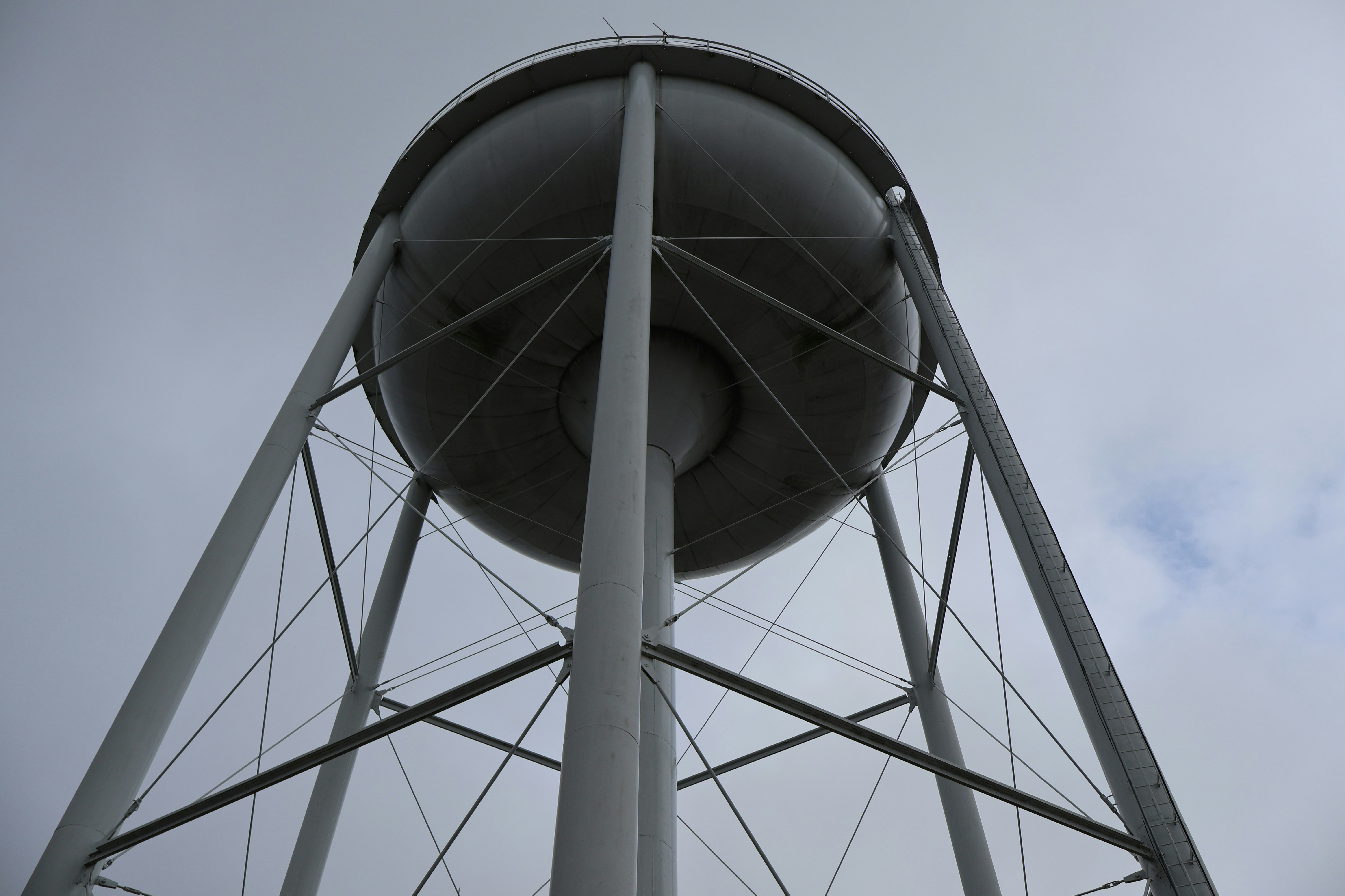 A tall water tower with a sky background photo – Free Black Image on ...
