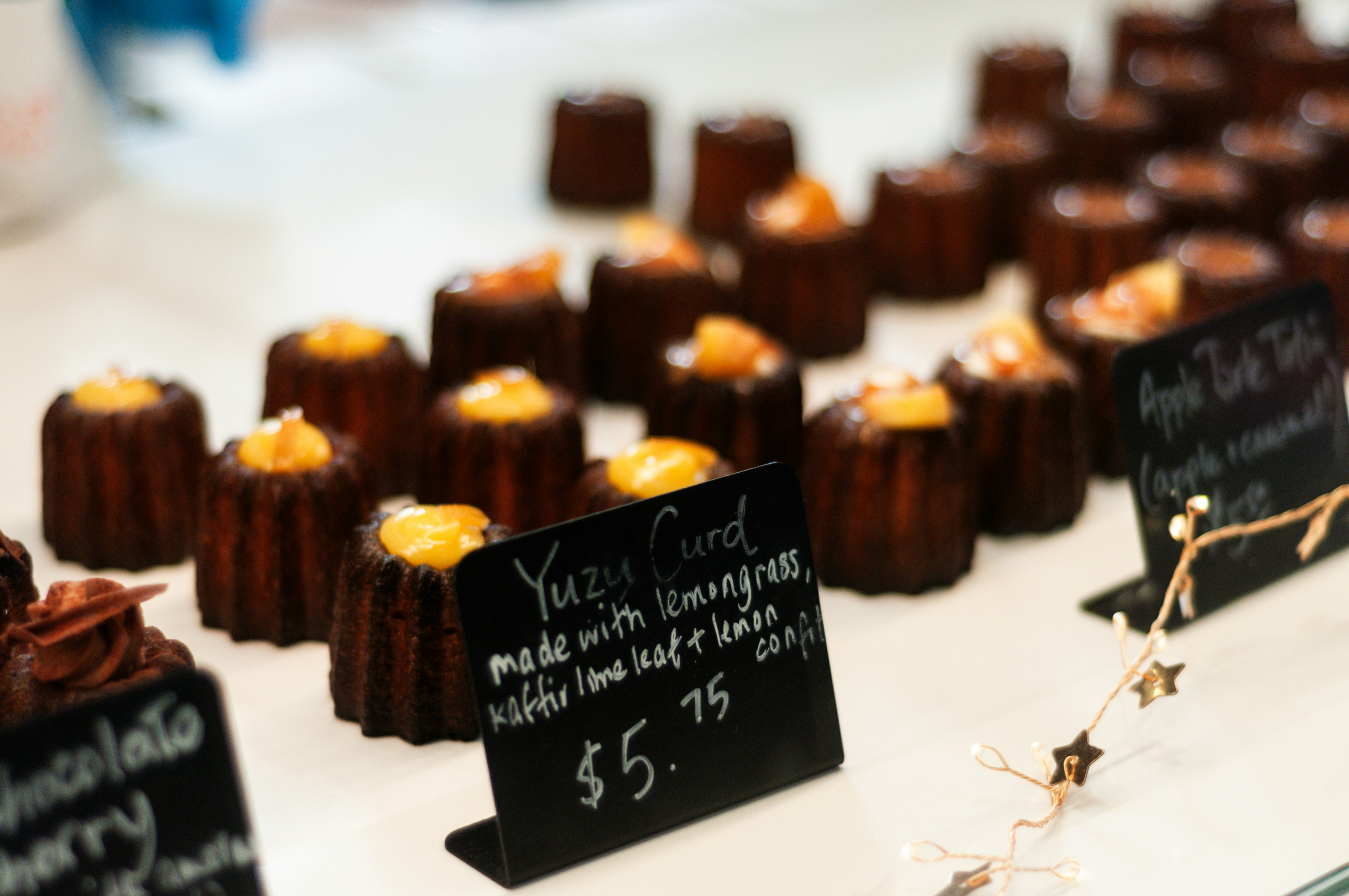 Yuzu-Curd Minis Line the White Display with Citrus Glow