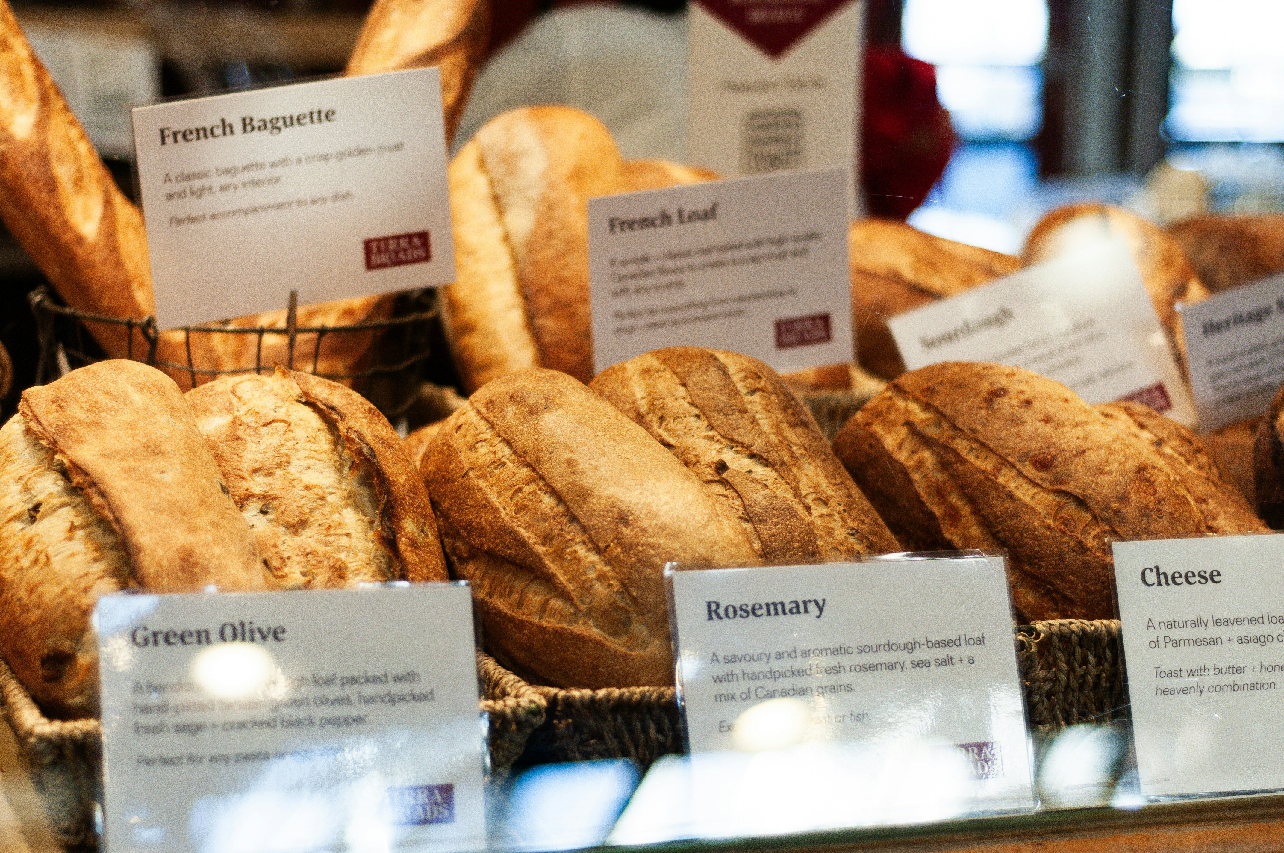 Crust Under Glass: Artisan Breads and Signage in a Bakery Display