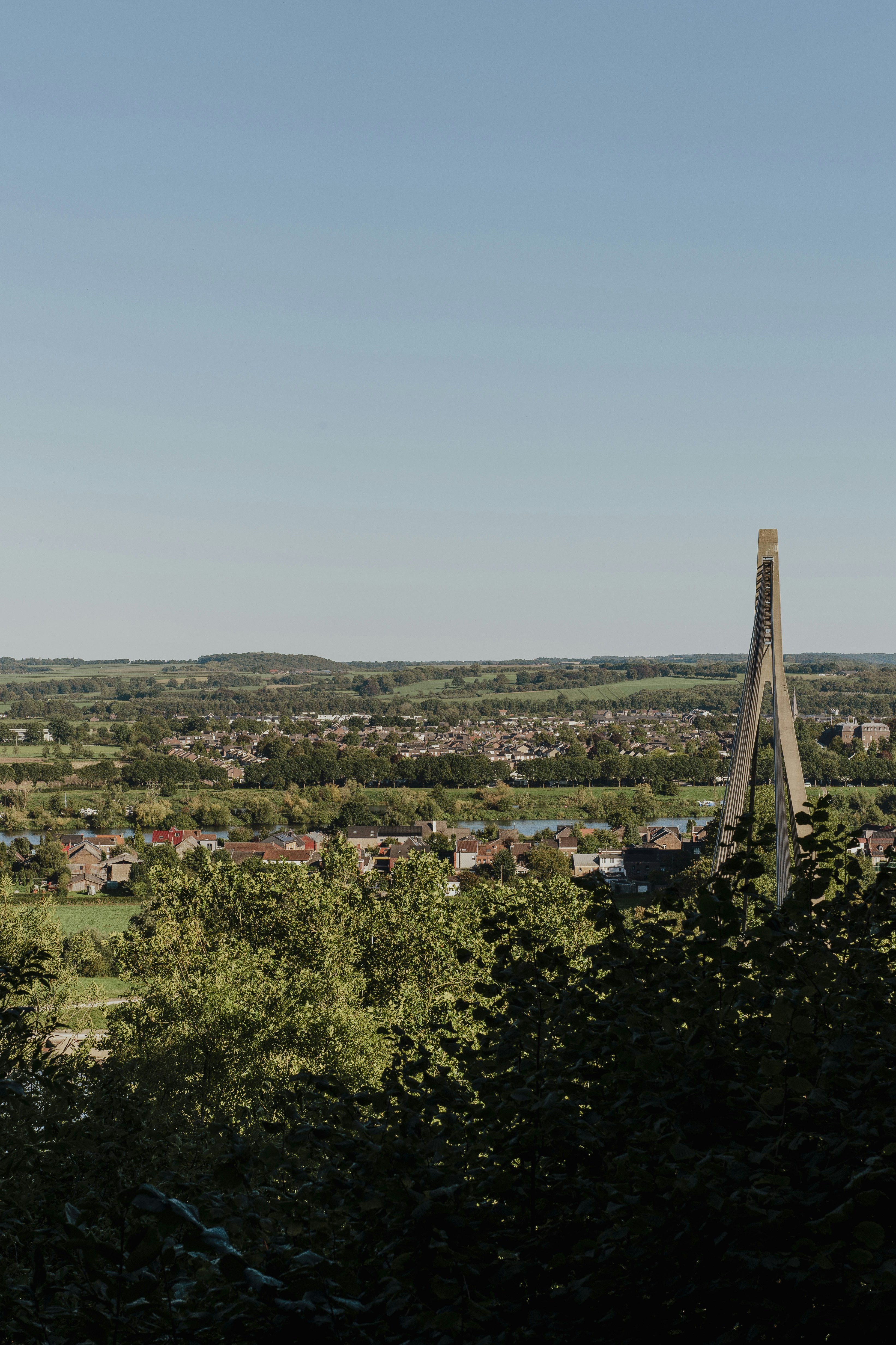 Bridge Tower Over a Quiet River Valley