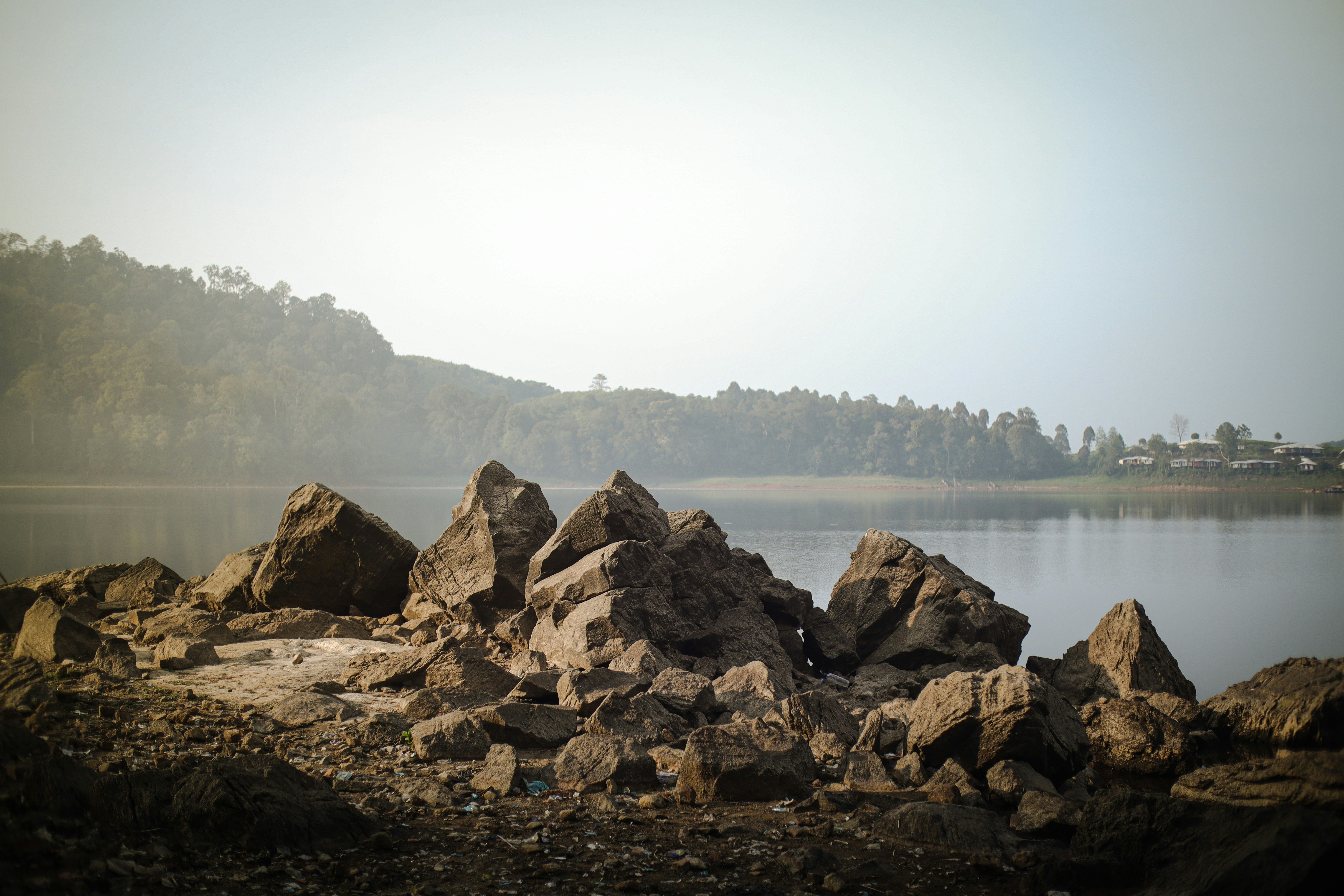 Rugged Rocks Framing a Calm Lakeside Morning