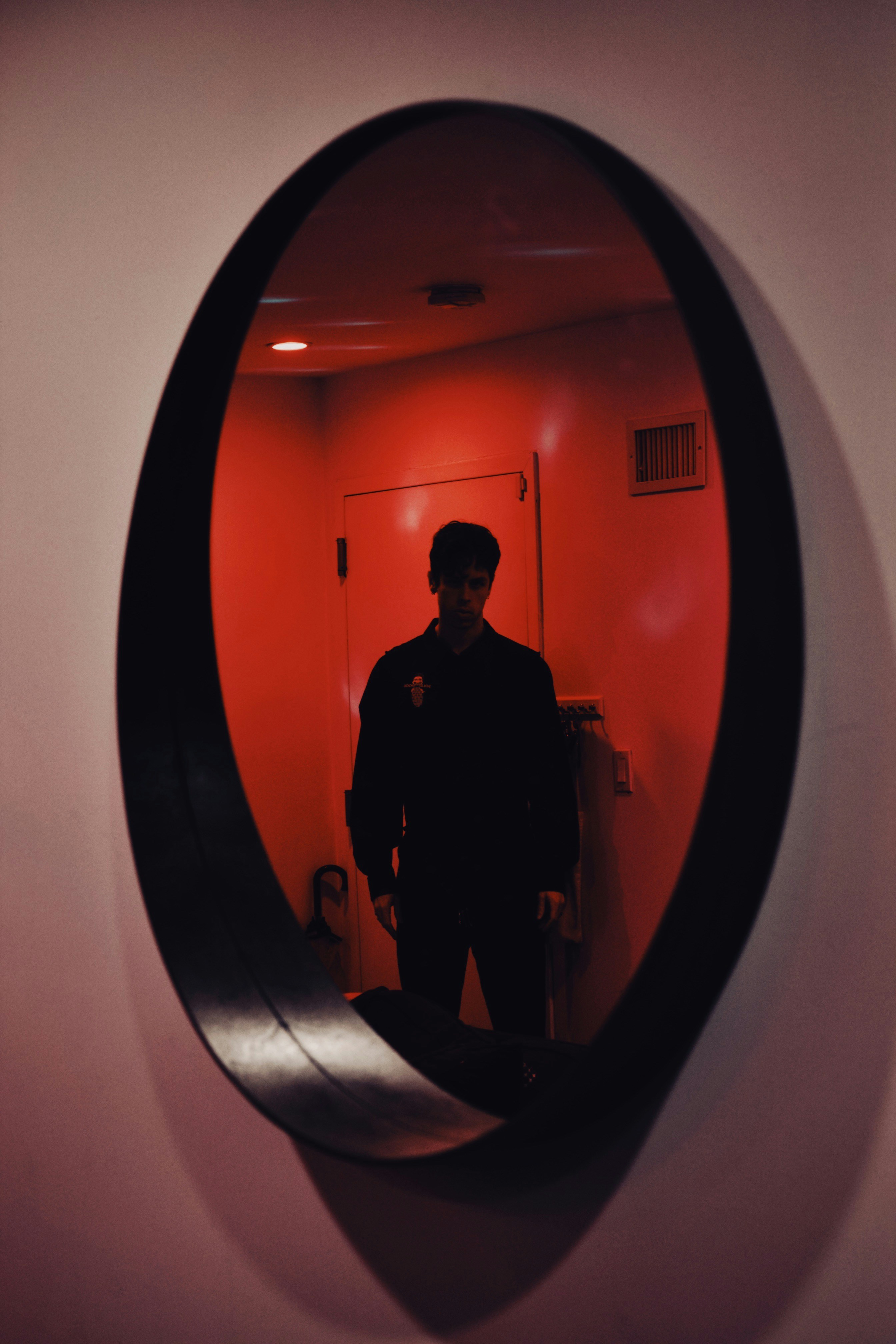 A man standing in front of a mirror photo – Free Usa Image on Unsplash