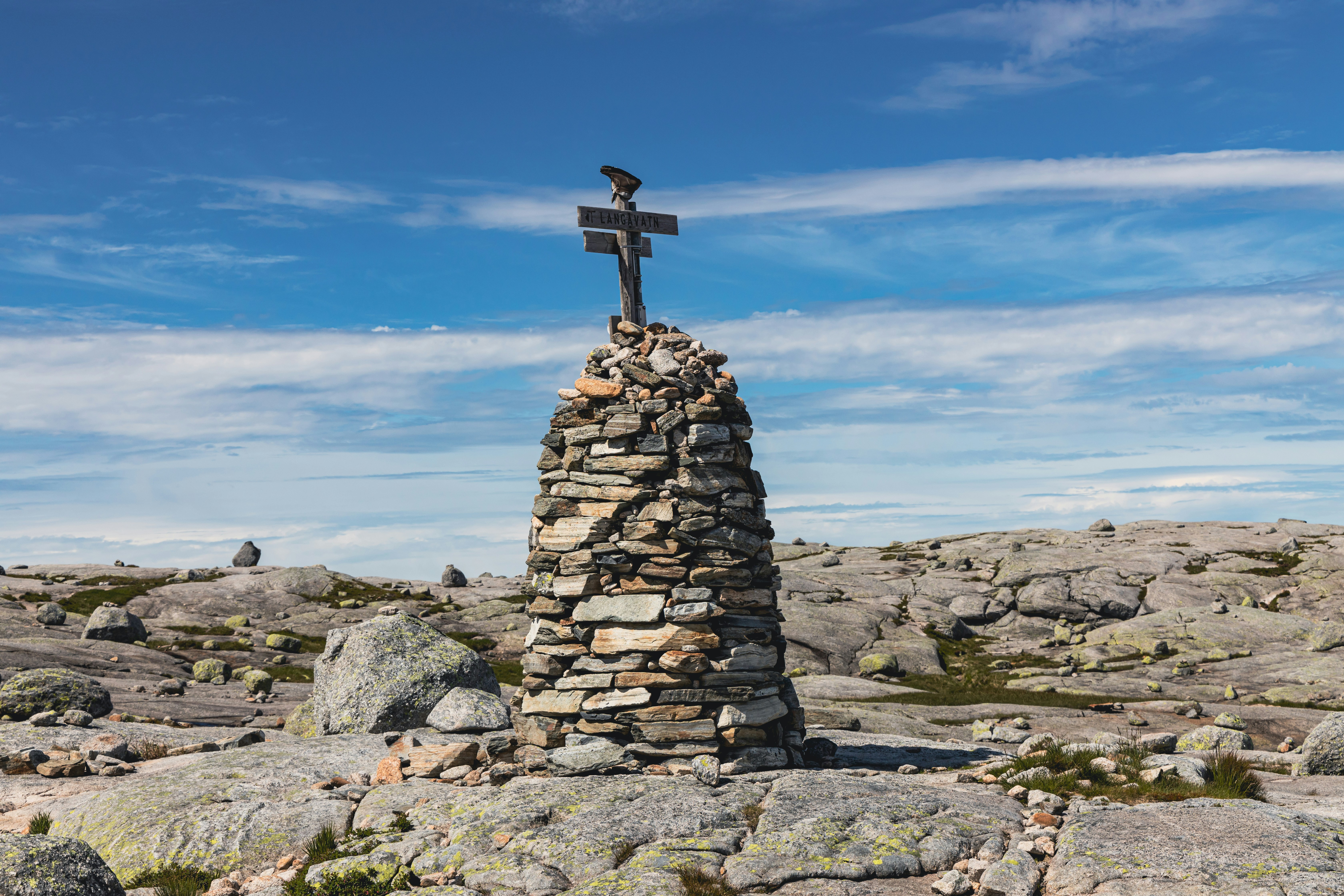 Stone Cairn Sentinel Under A Blue Sky