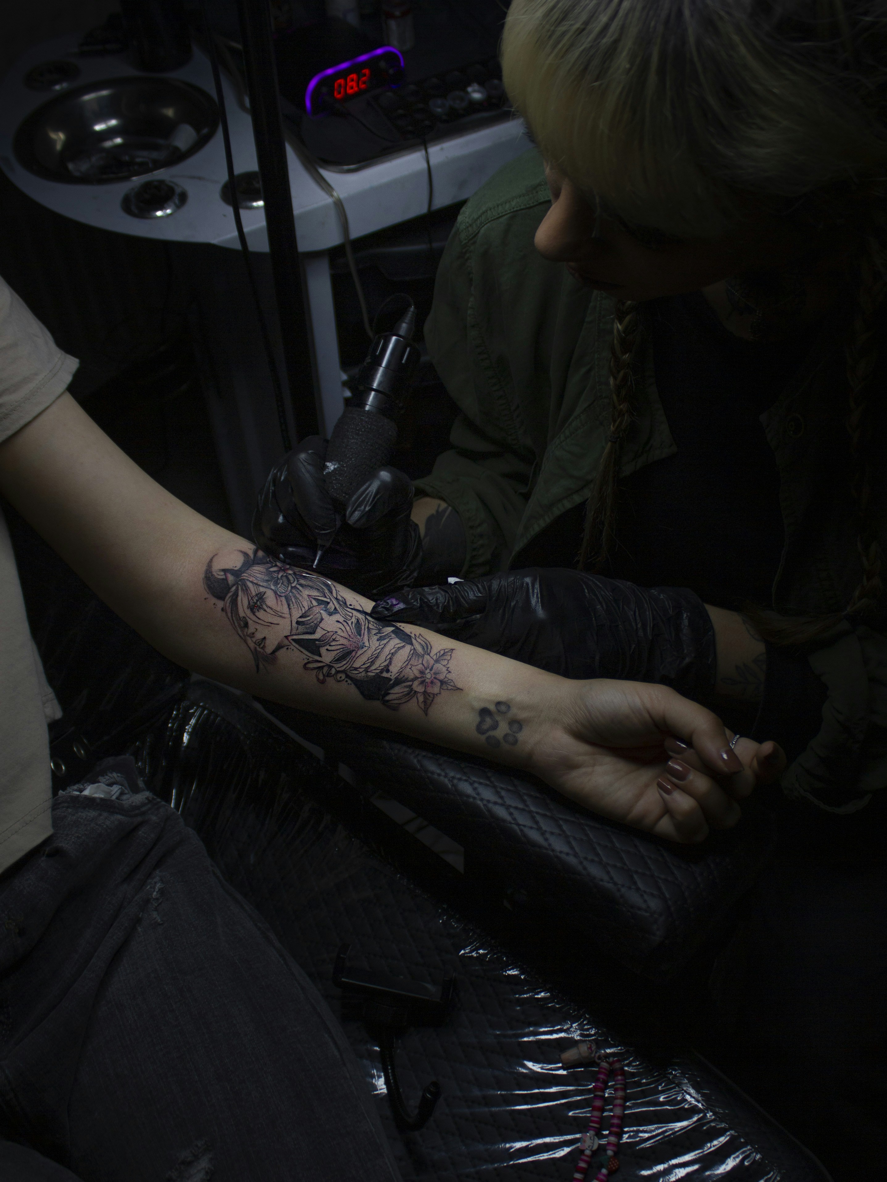 Floral Sleeve in Progress: Ink Shapes Bloom Under Studio Glow