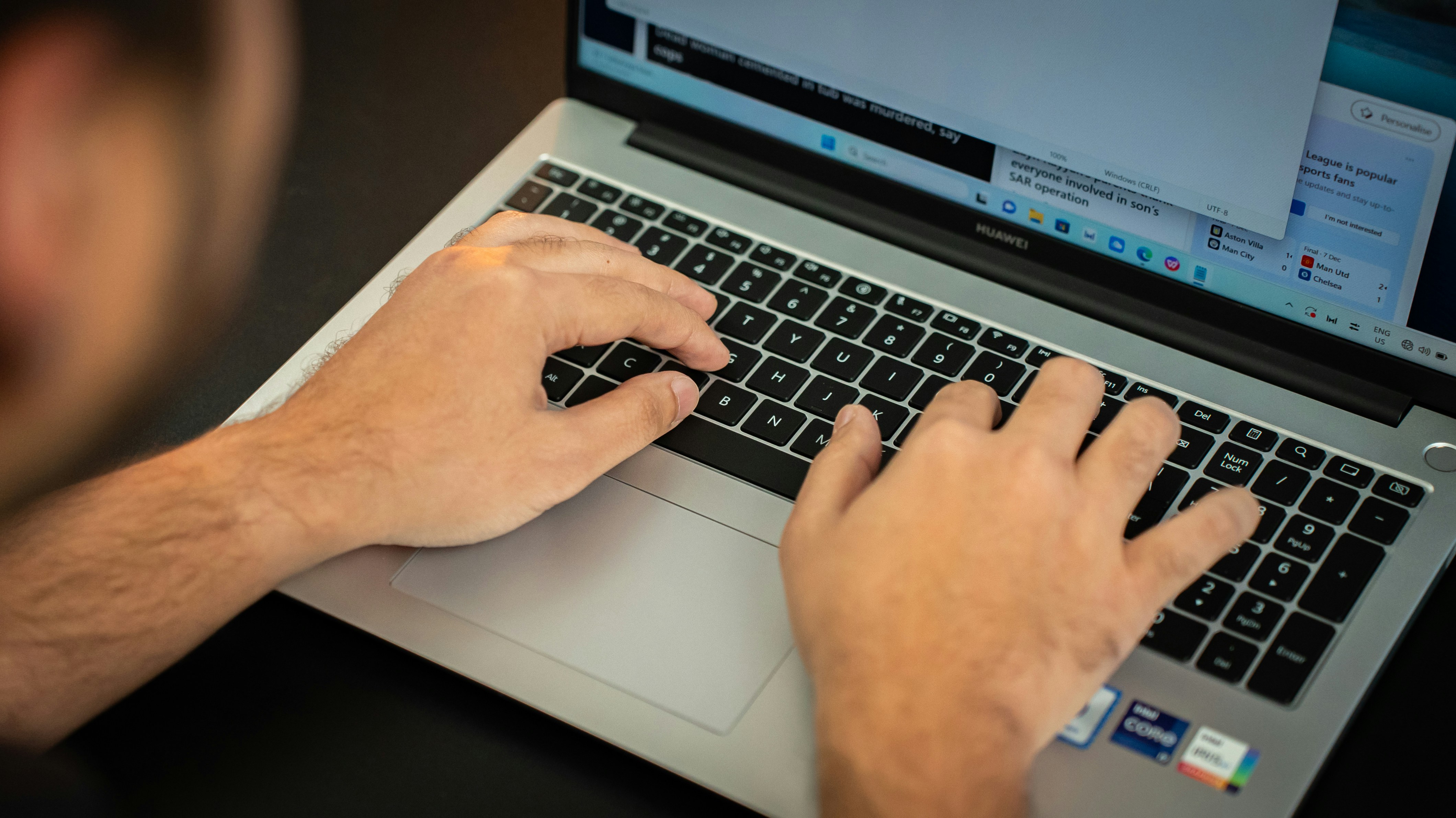 A man is typing on a laptop keyboard photo – Free Laptop Image on Unsplash