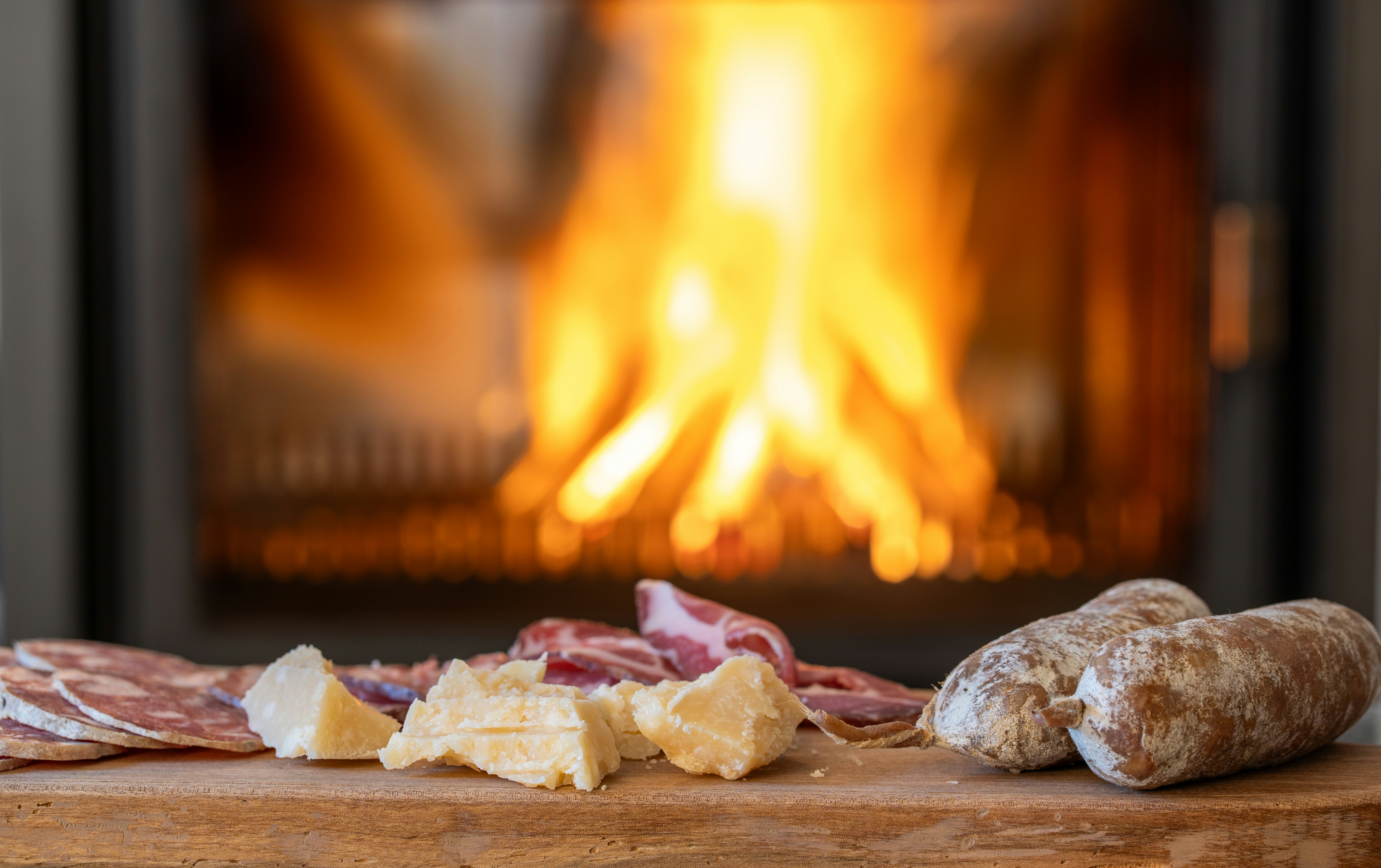 Ember-Glow Platter: Cheese, Charcuterie, and Bread on a Hearth
