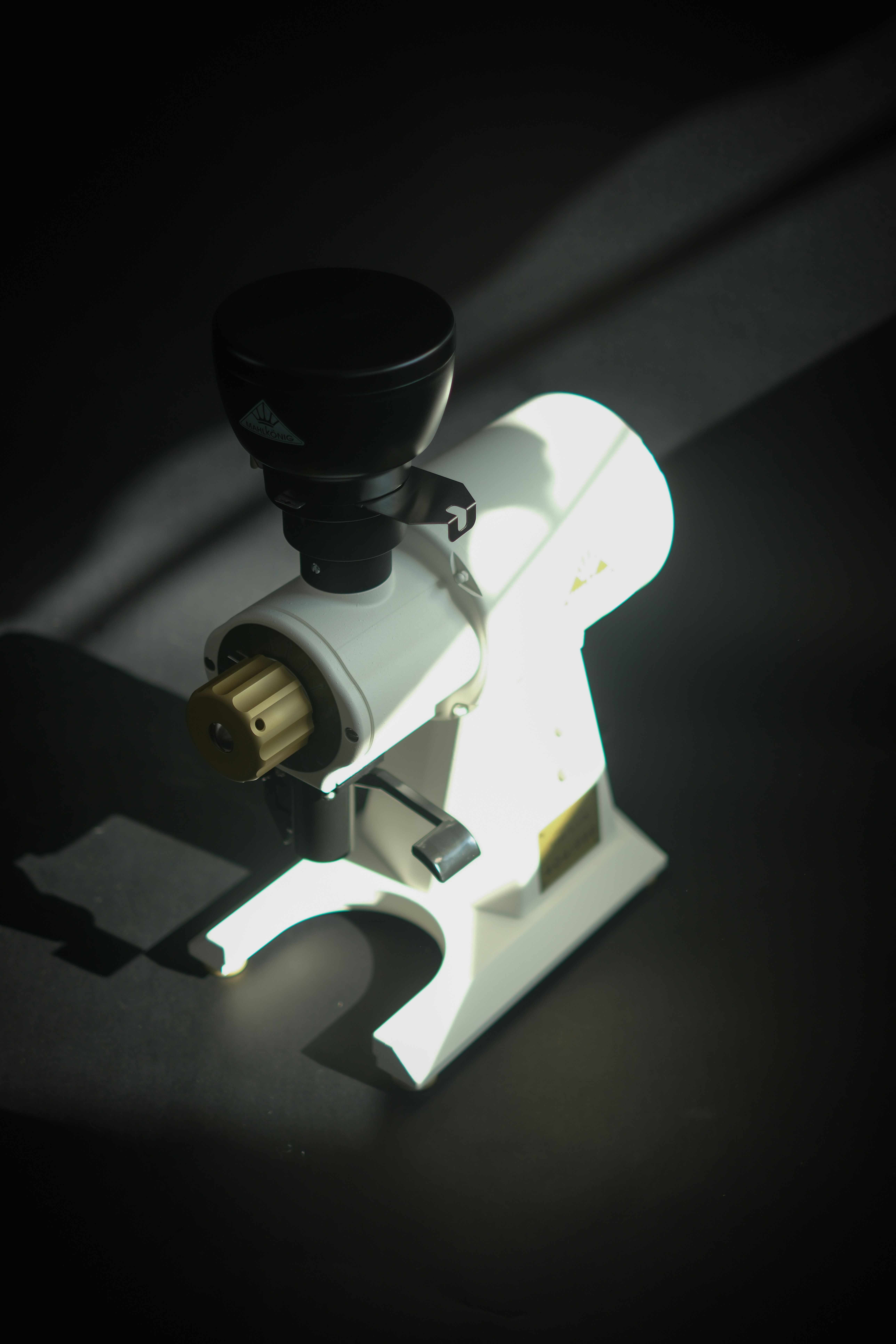 A close up of a white object on a black surface photo – Free Federal ...