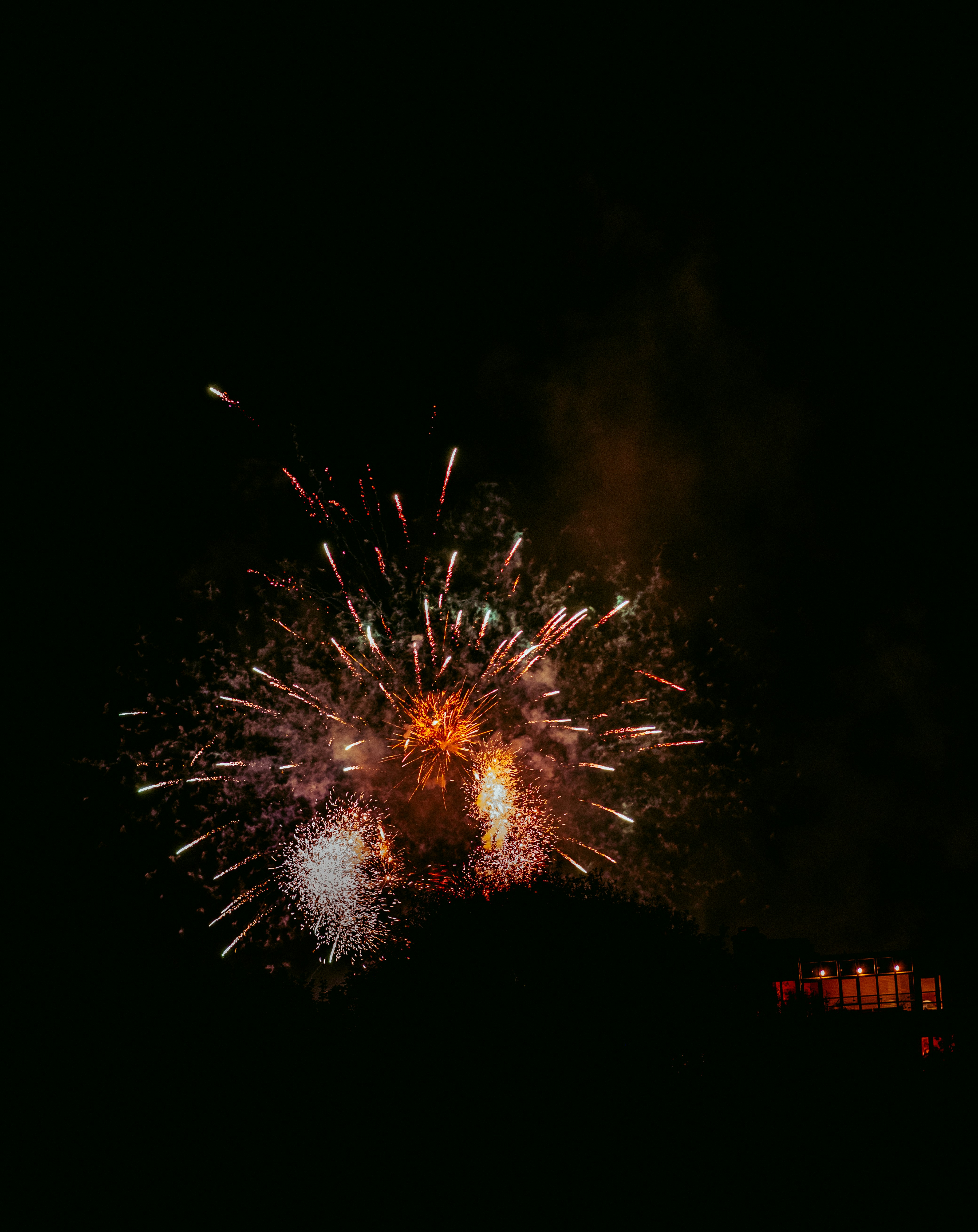 A large fireworks is lit up in the night sky photo – Free Fireworks ...