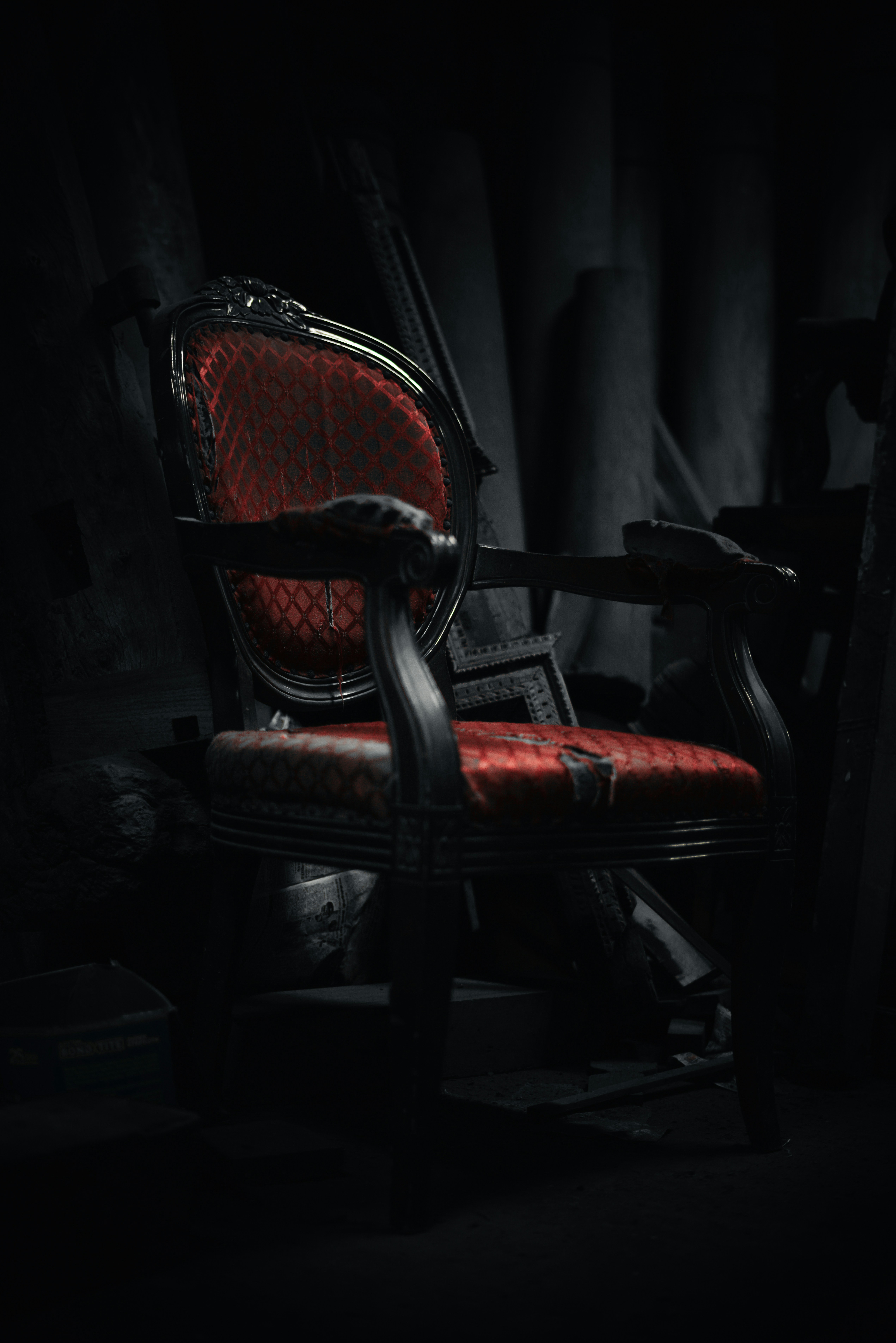 Red Velvet Throne in a Shadowed Studio