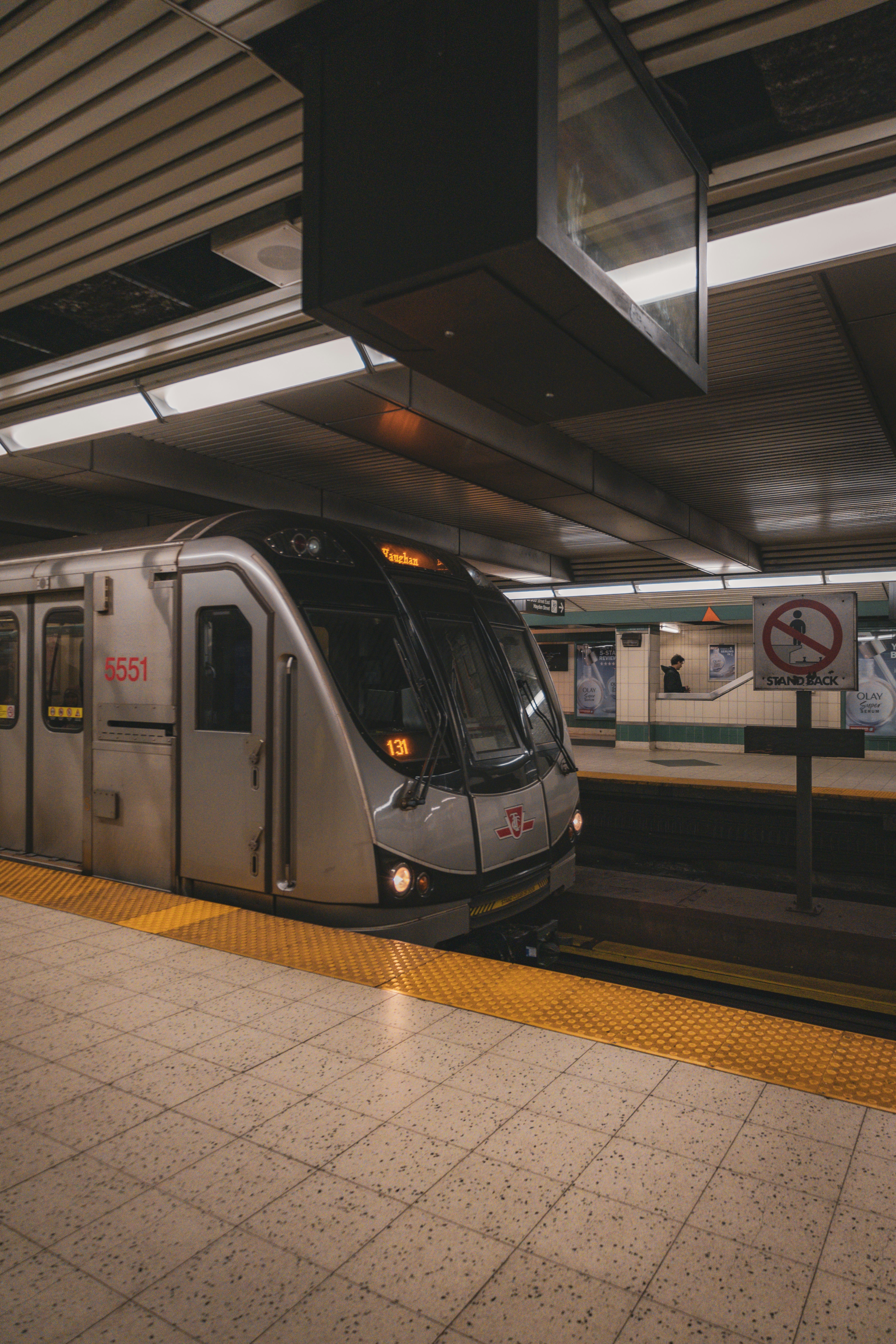 A subway train pulling into a train station photo – Free Toronto Image ...