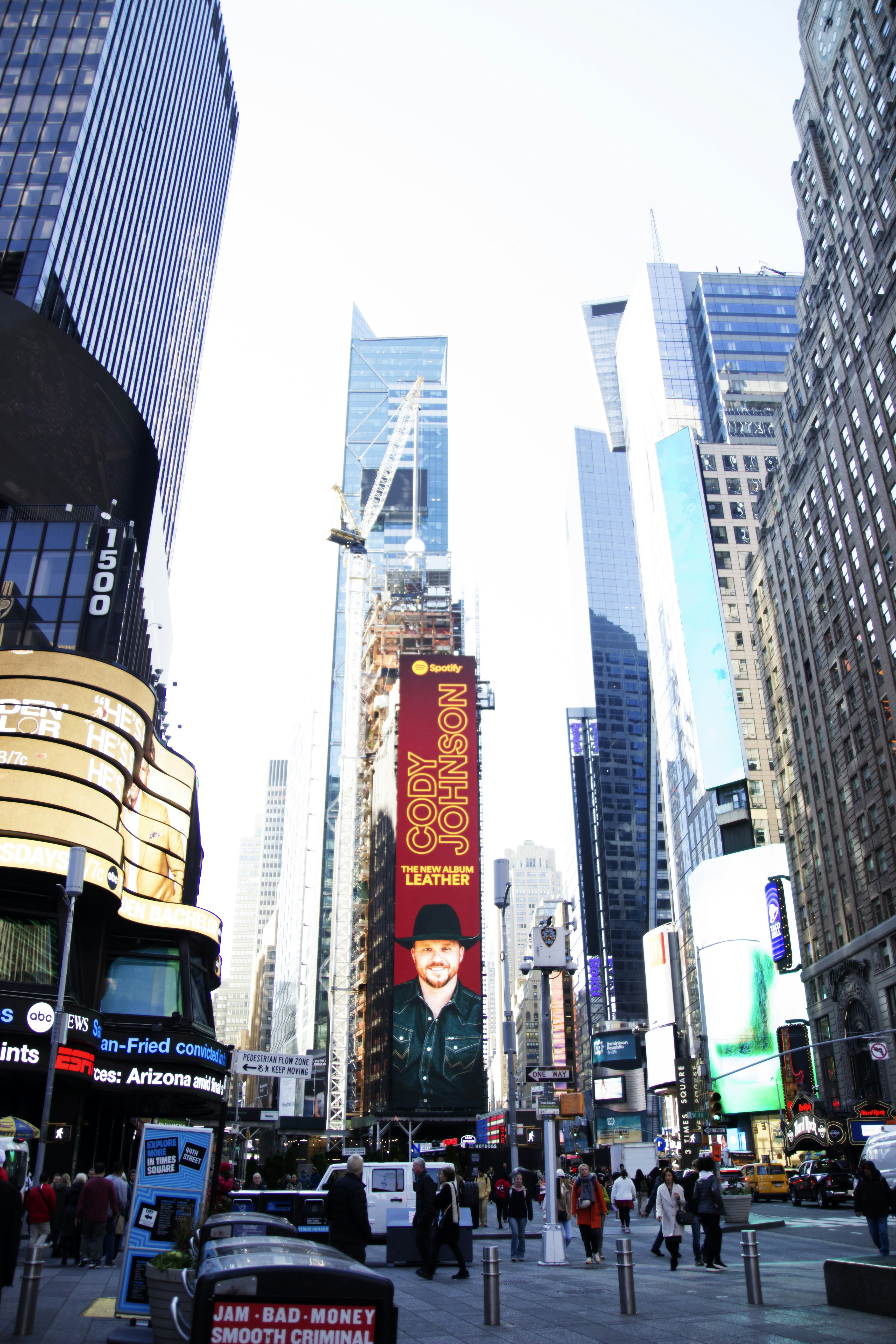 Vertical Billboard Banner Amid Times Square Neon Canyon