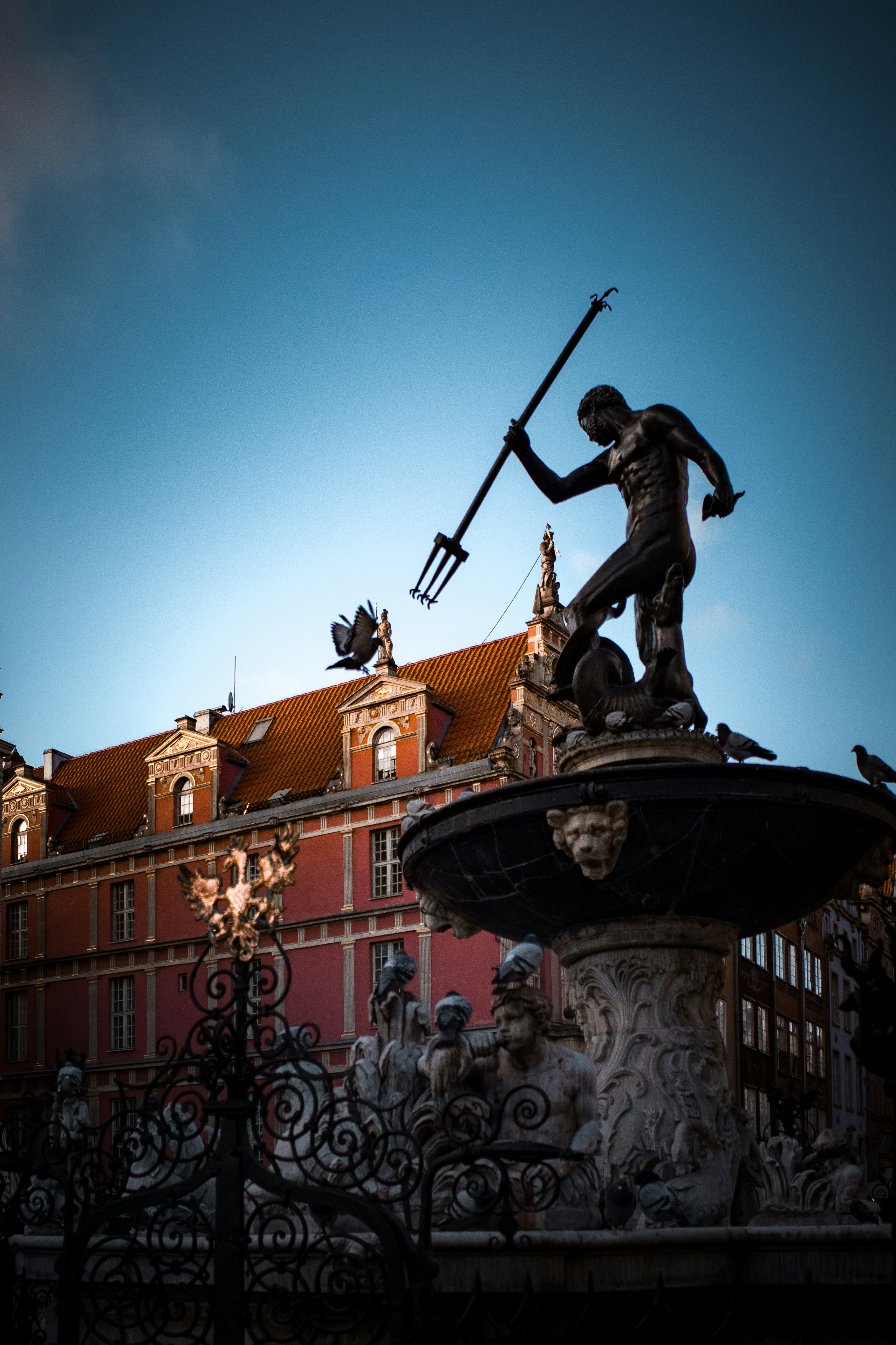 Neptune's Lunge: A Monumental Fountain Framed by Baroque Facades