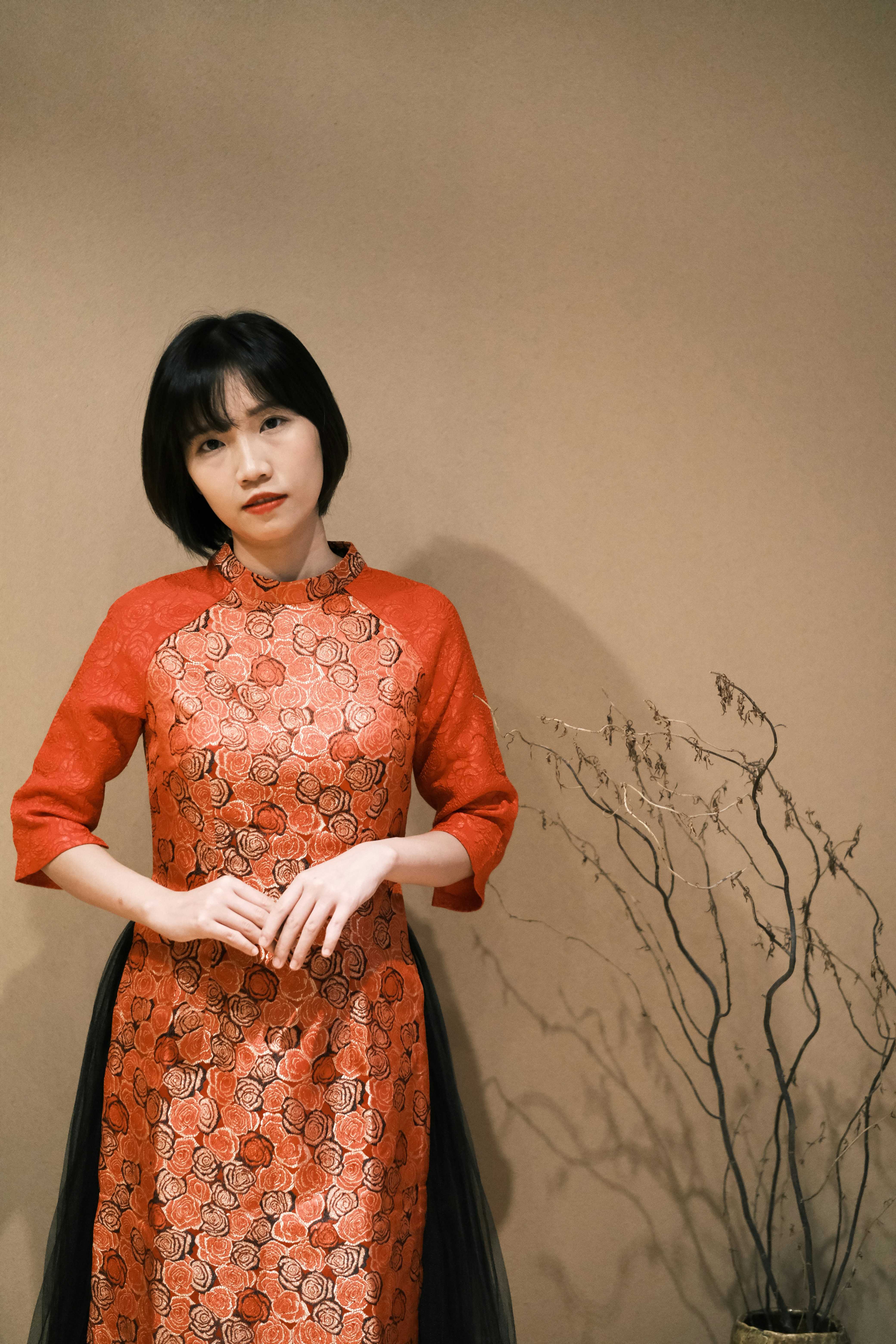 Red Silk in Quiet Light: Studio Portrait in a Floral Cheongsam