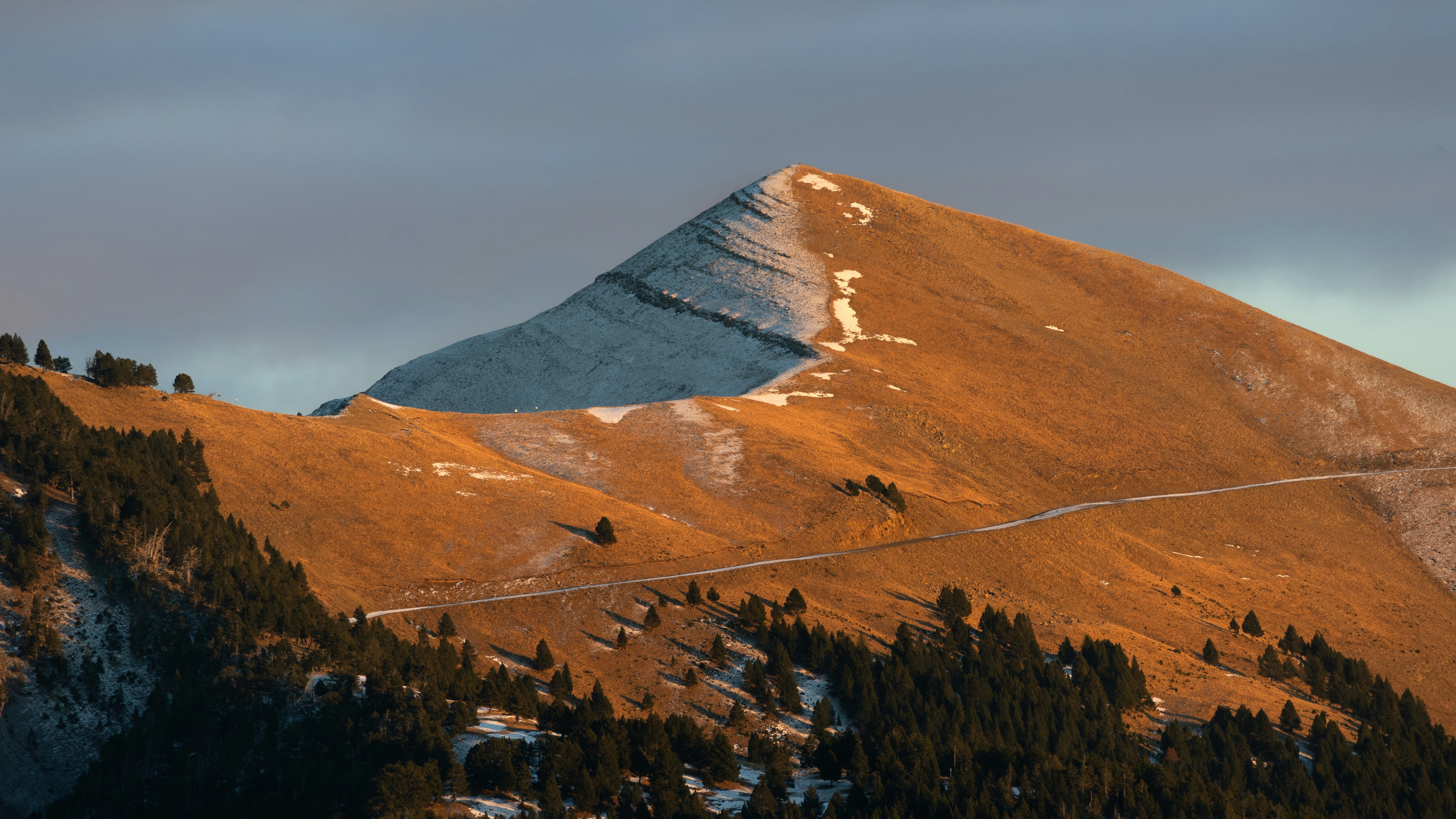 A snow covered mountain with trees on the side photo – Free Ordesa ...