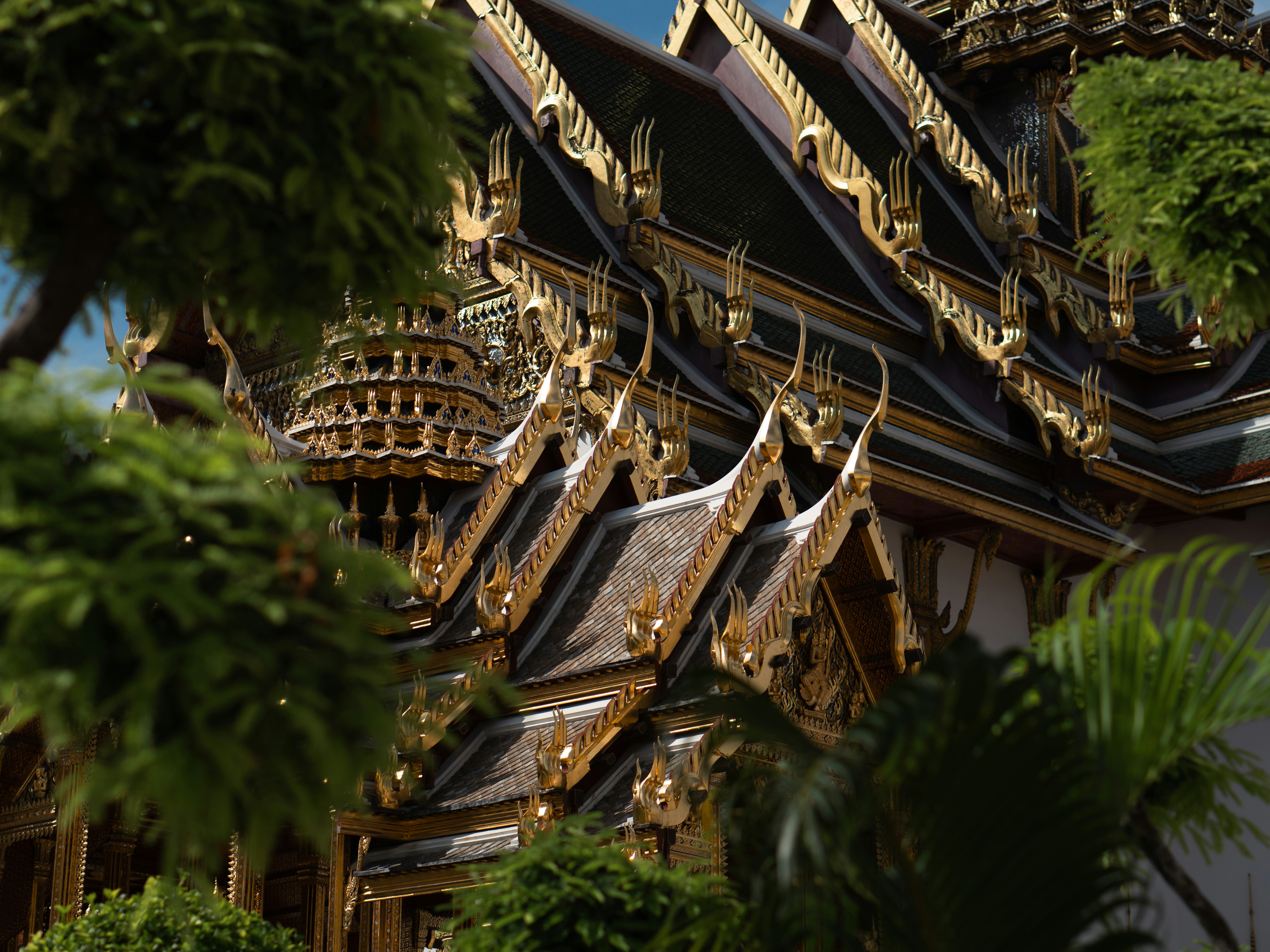 A building that has a lot of gold on it photo – Free Bangkok Image on ...
