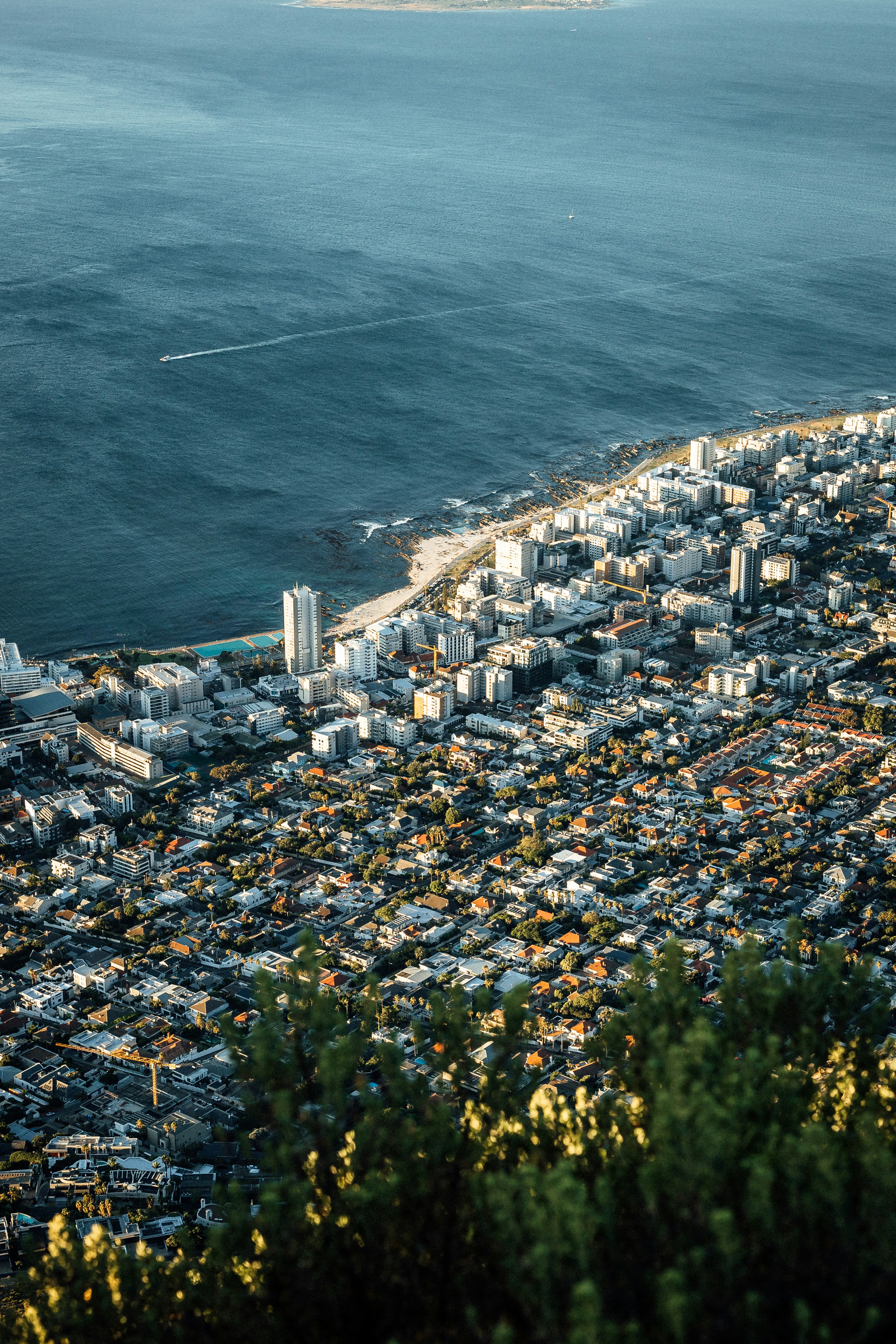 An aerial view of a city next to the ocean photo – Free Cape town Image ...