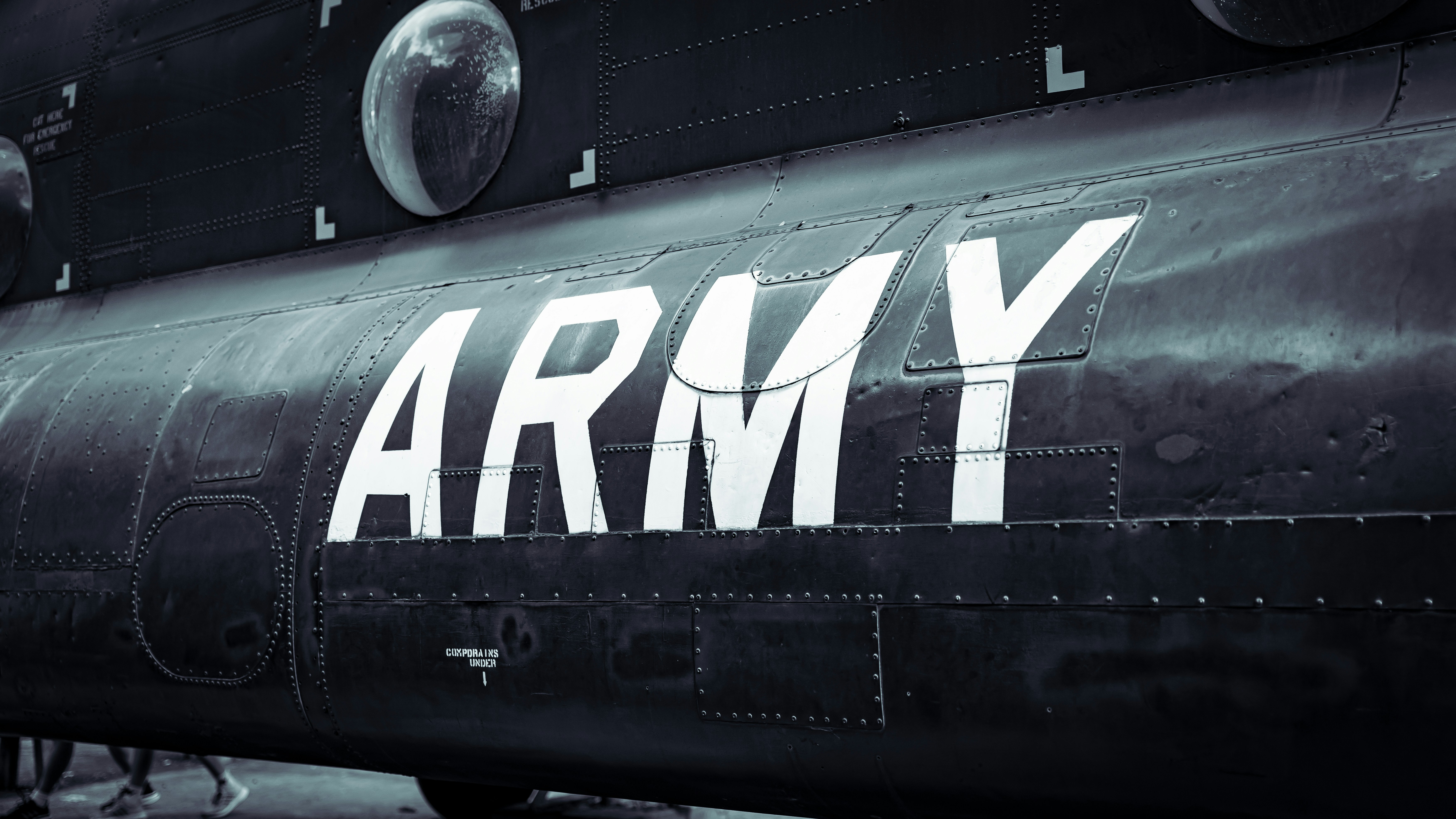 A black army plane with the word army painted on it photo – Free ...