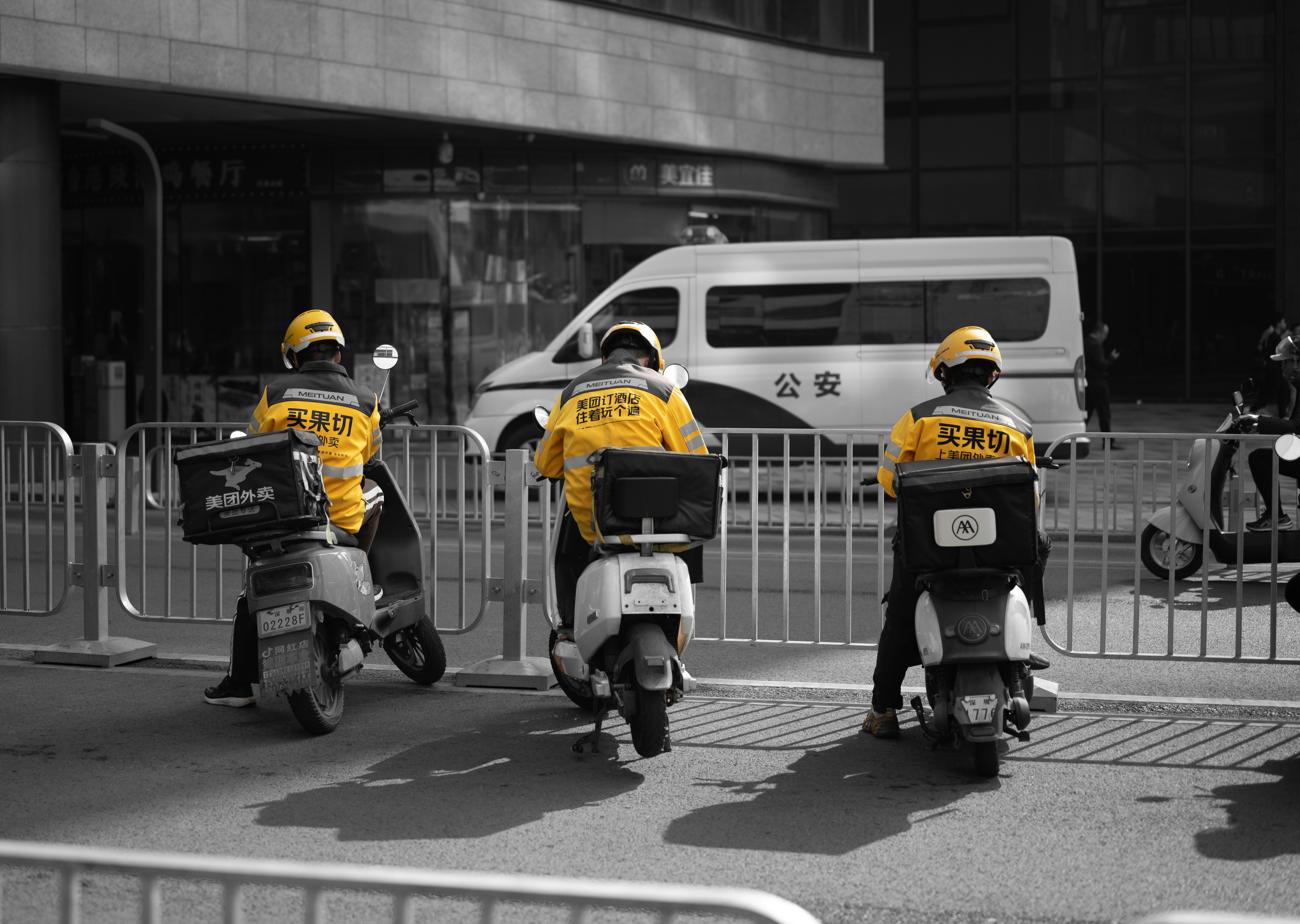 A group of people on motor scooters on a city street photo – Free Adult ...