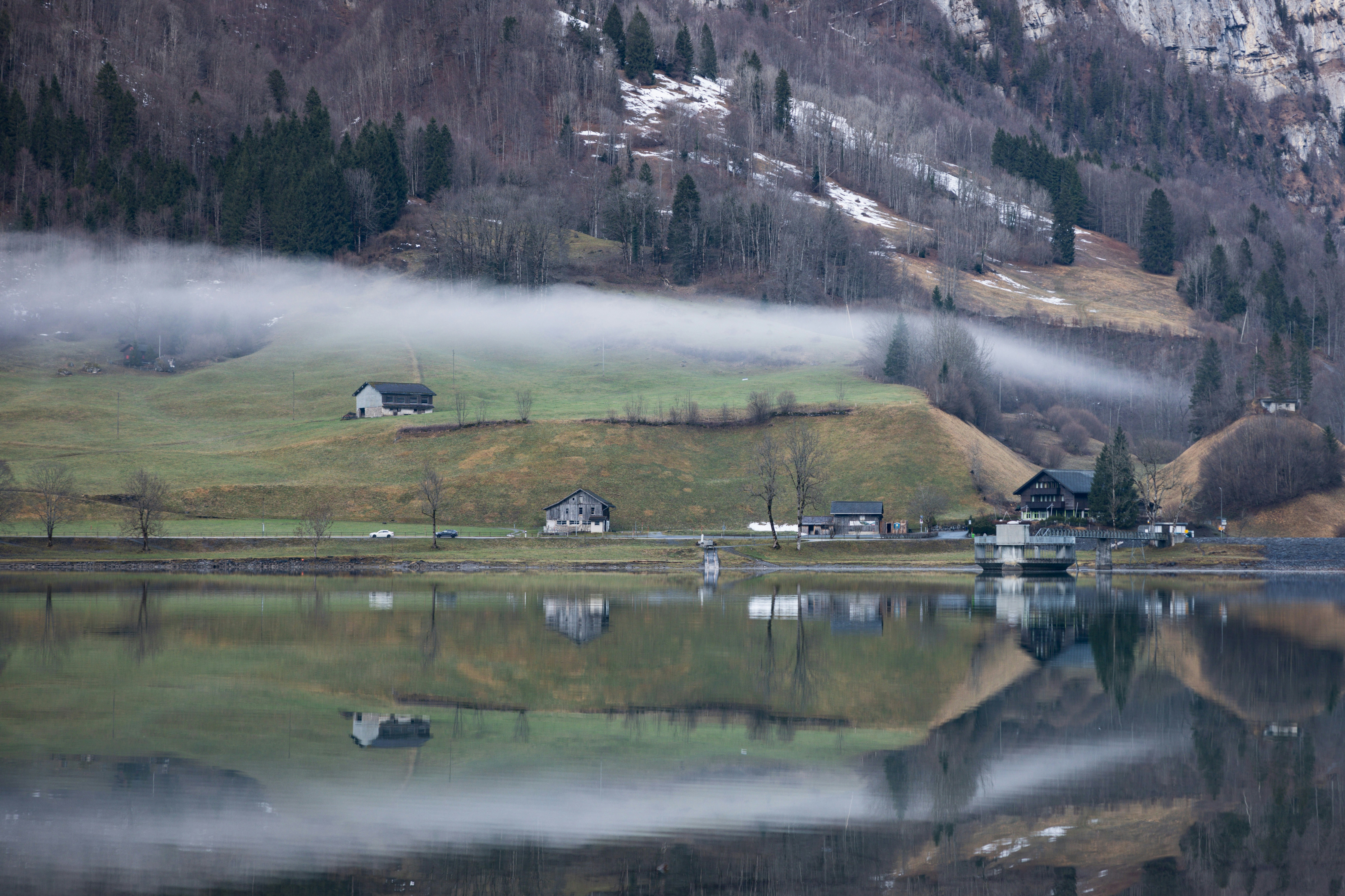 Whispering Mist Over Alpine Reflection