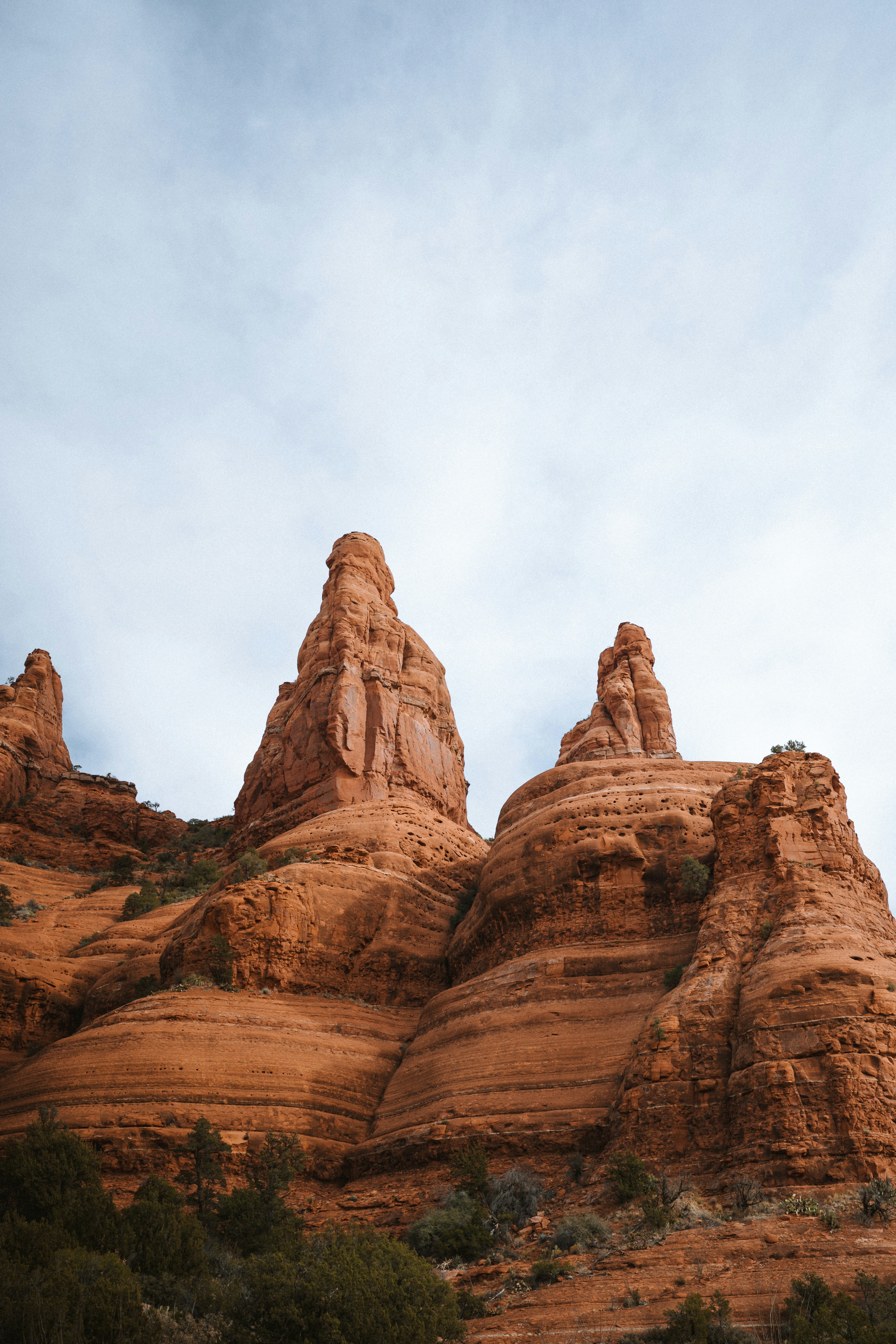 A large rock formation in the middle of a desert photo – Free Sedona ...