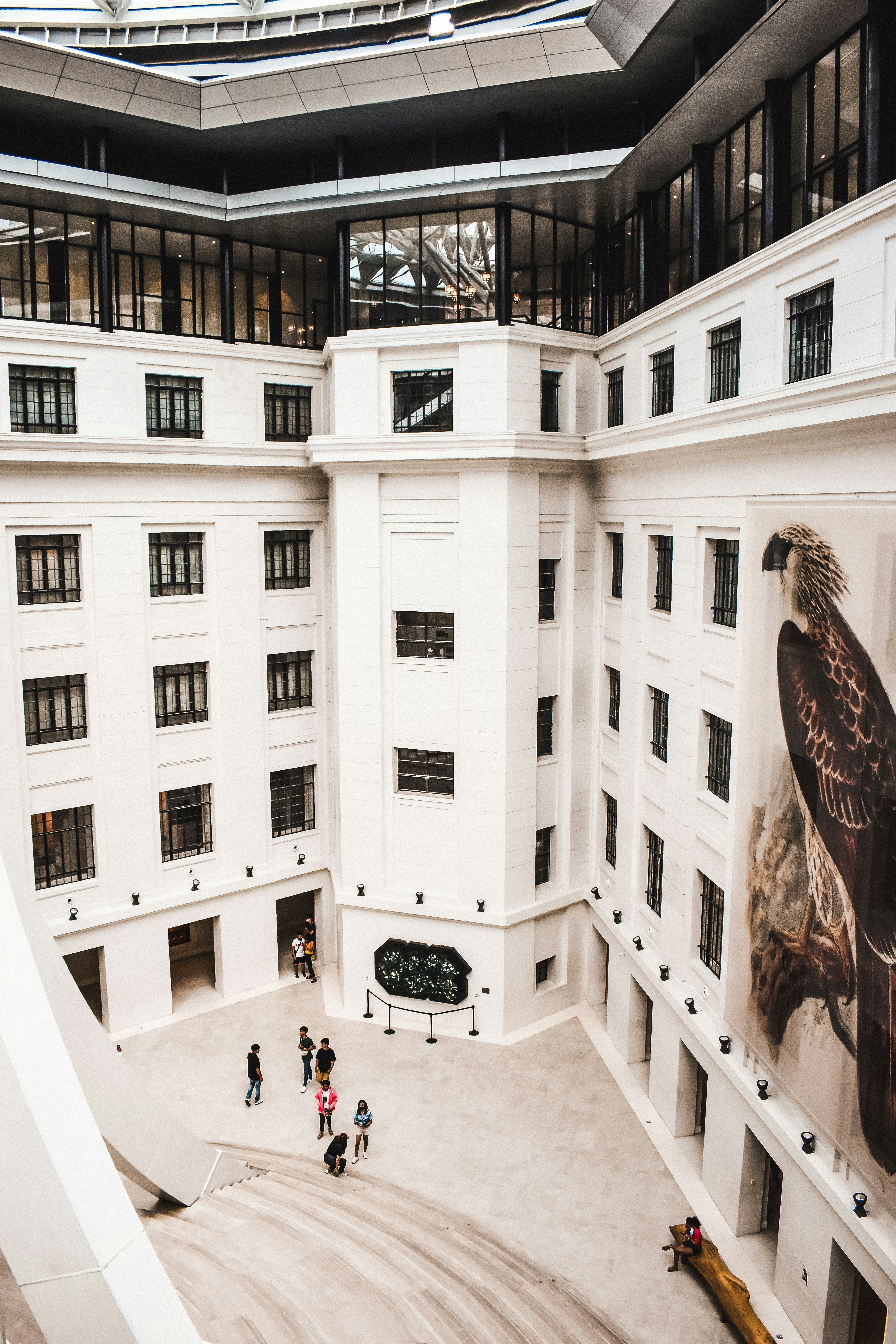 Atrium Echoes: A Lion Banner Adorns the Courtyard