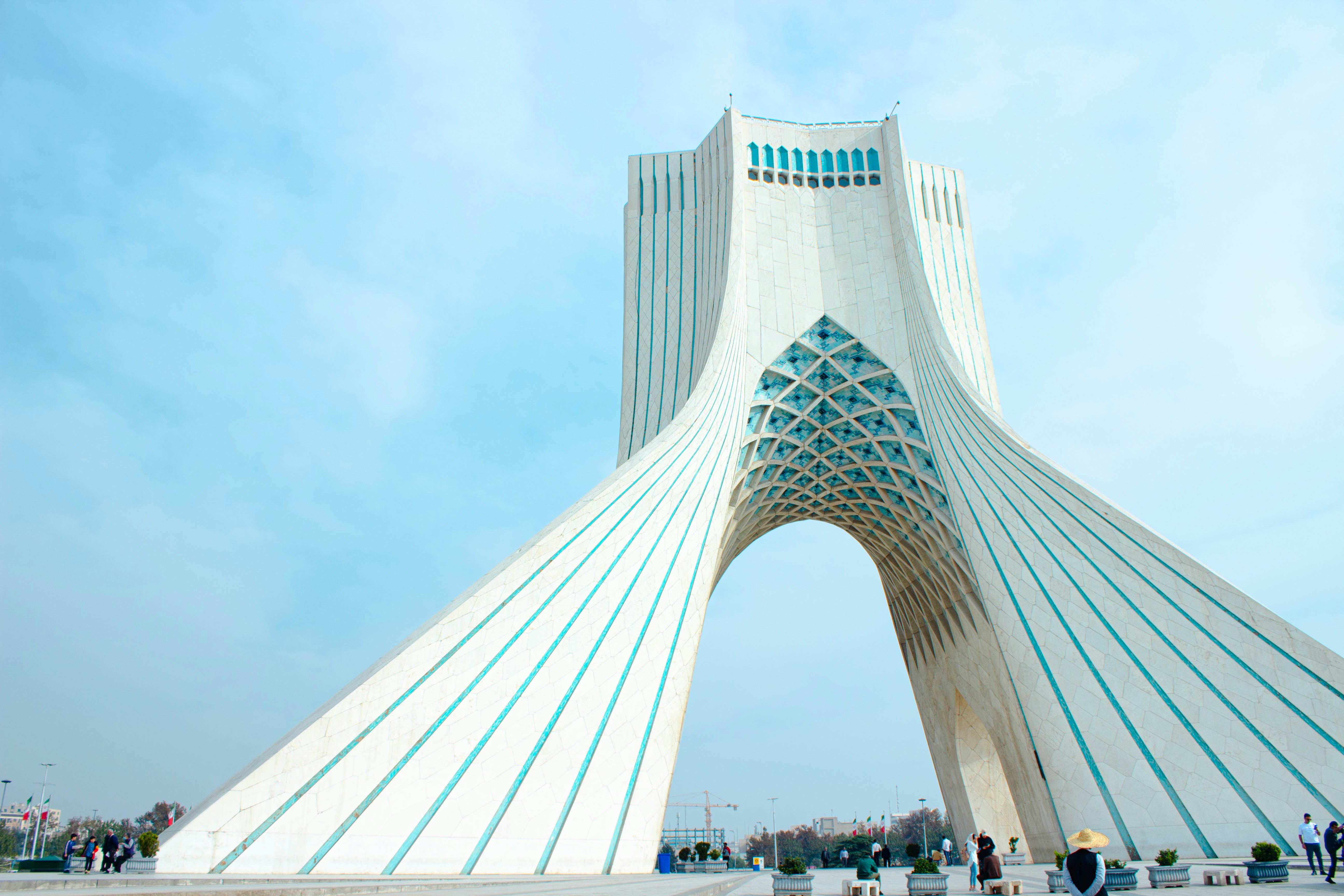 A very tall building with a very tall tower photo – Free Tehran tower ...
