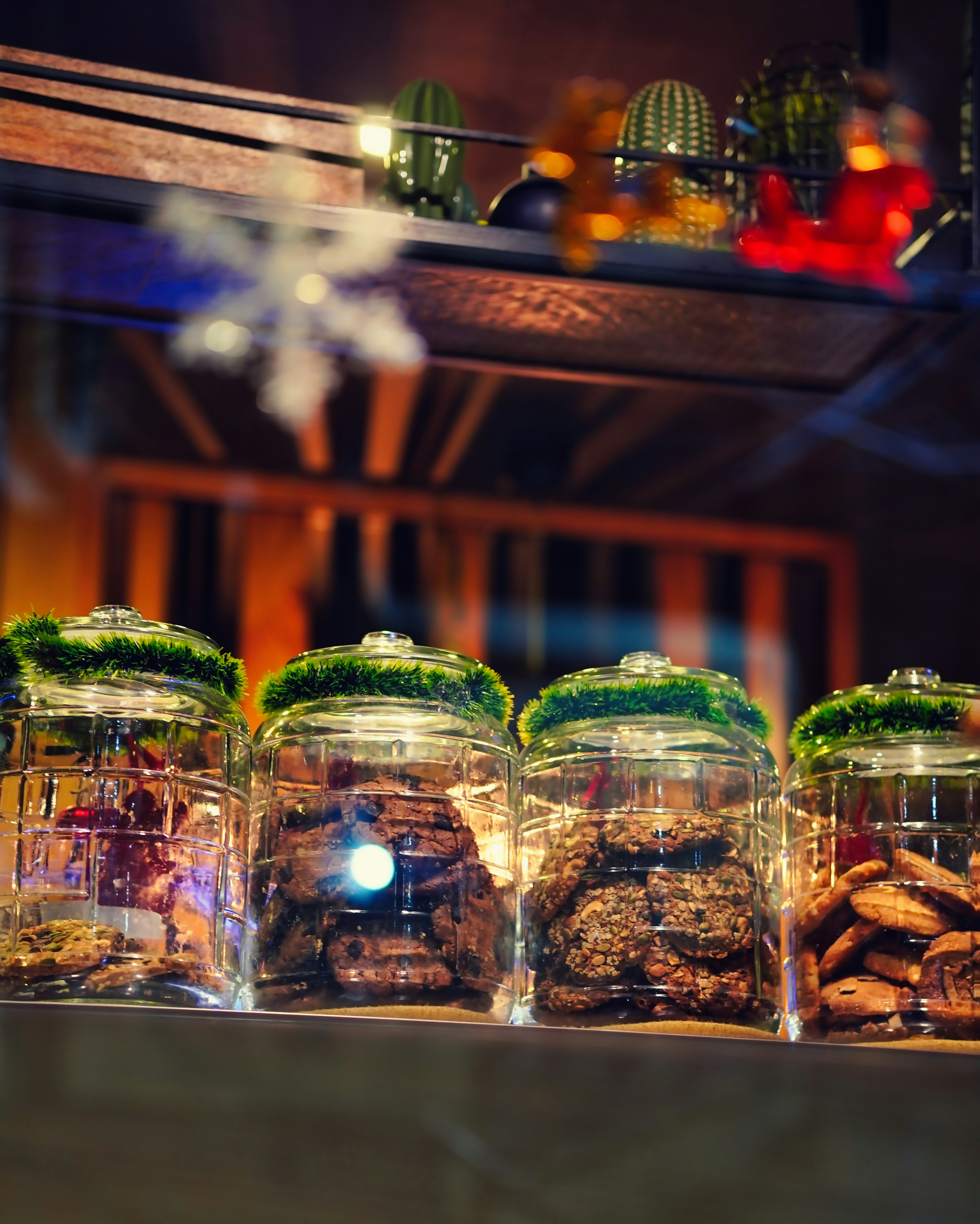 Moss-Lidded Cookie Jars: Warm Light on a Shelf
