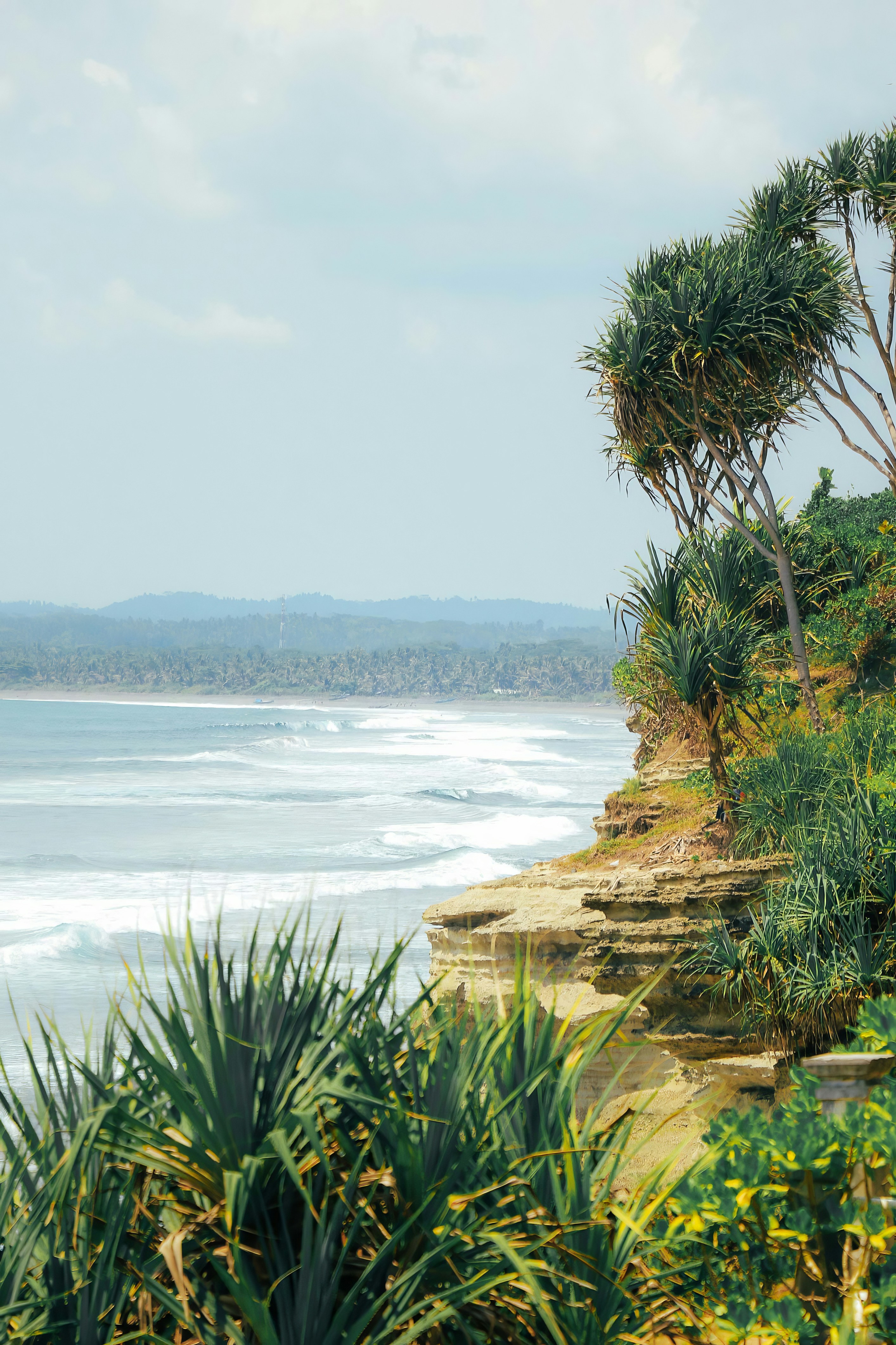 a view of the ocean from a cliff
