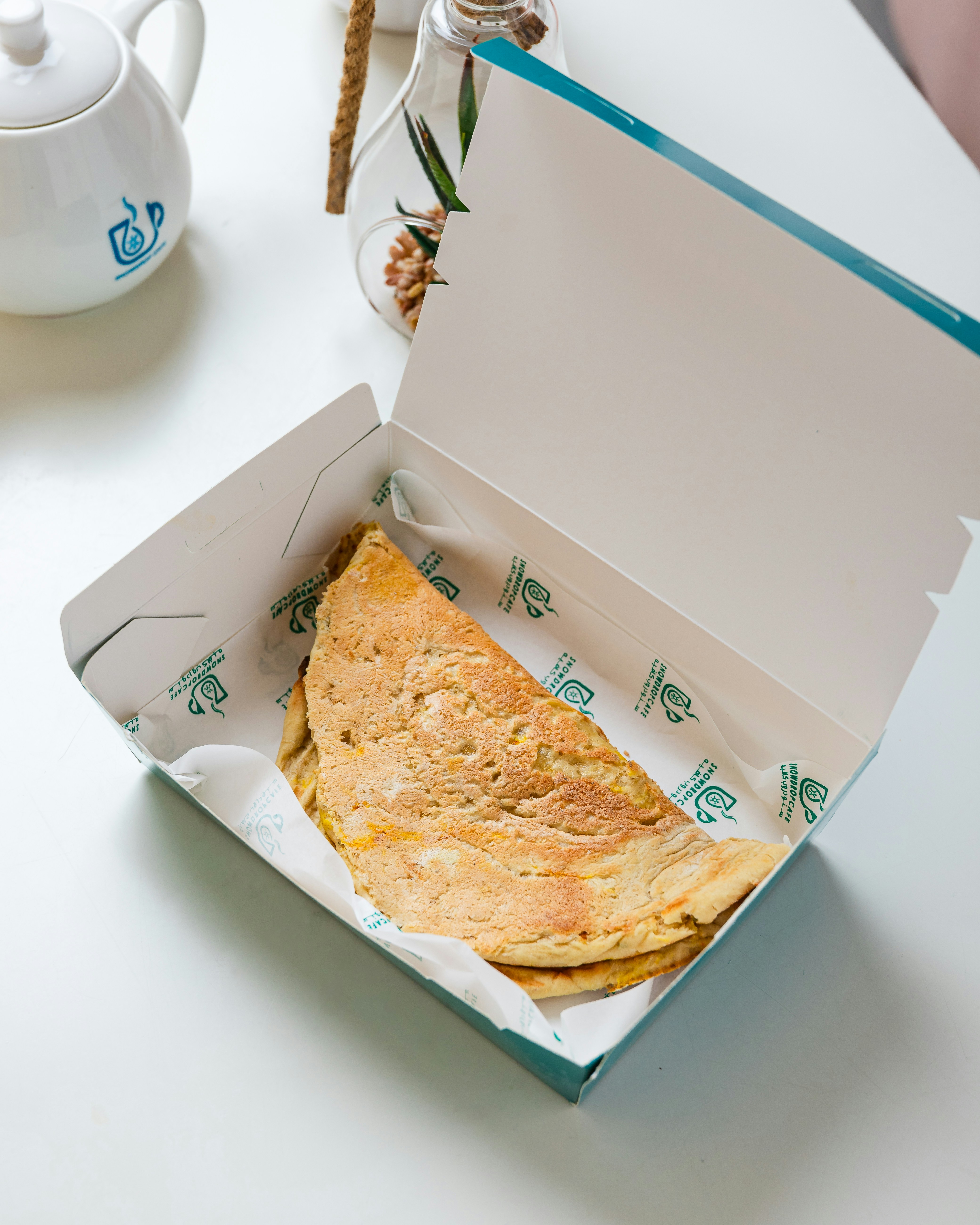 A Quiet Morning Crepe Revealed: Minimalist Takeout Box Moment