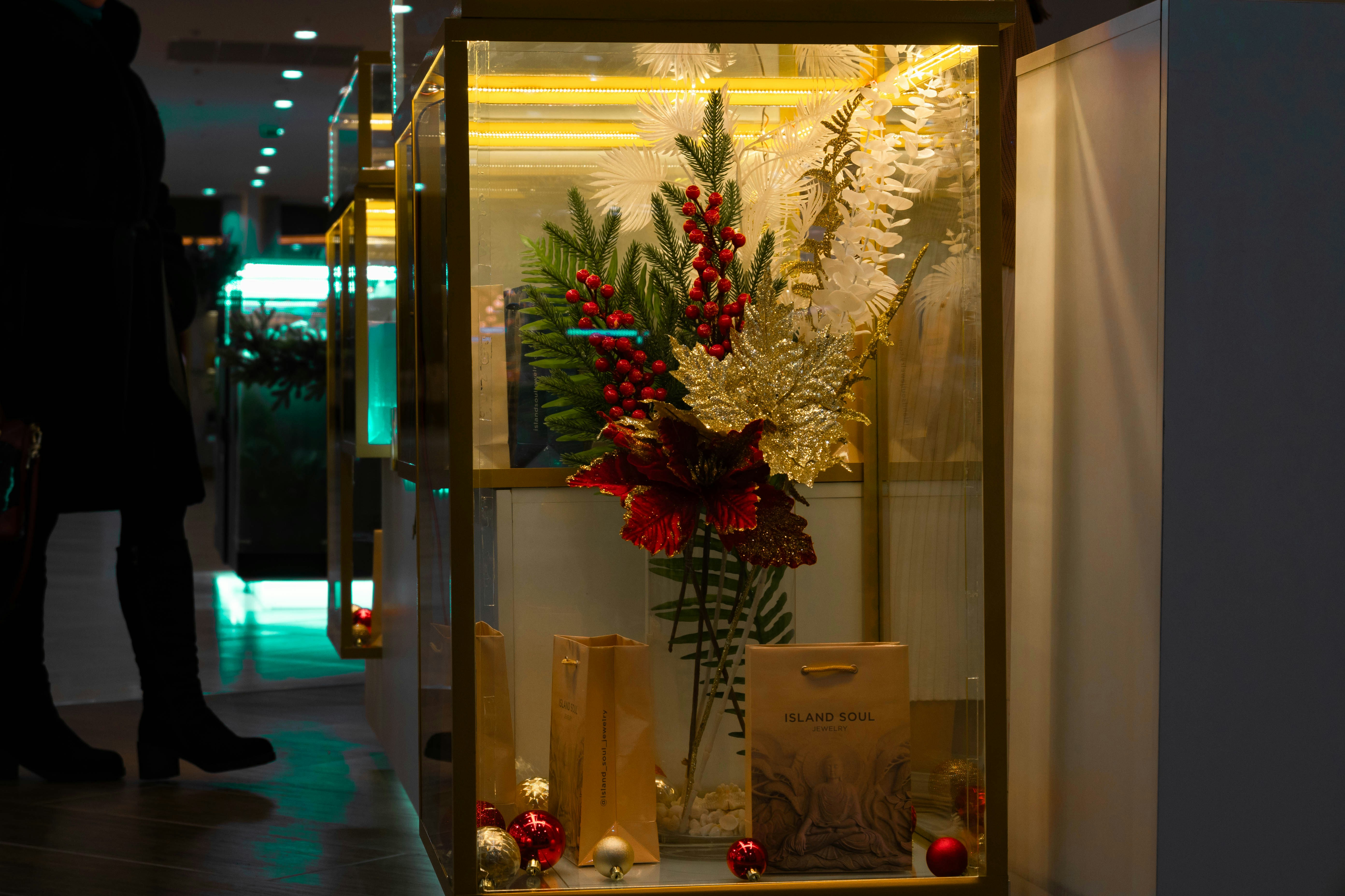 A display case filled with flowers and candles photo – Free Photo Image ...