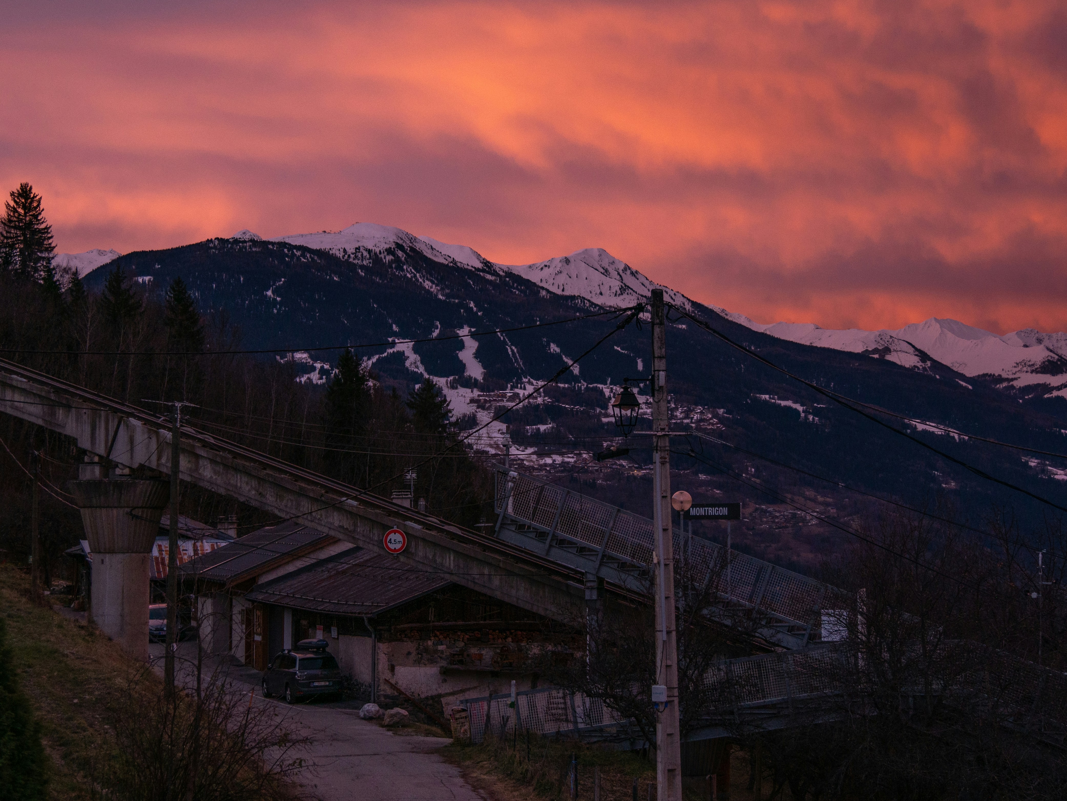 A mountain covered in snow with a red sky photo – Free Montrigon Image ...