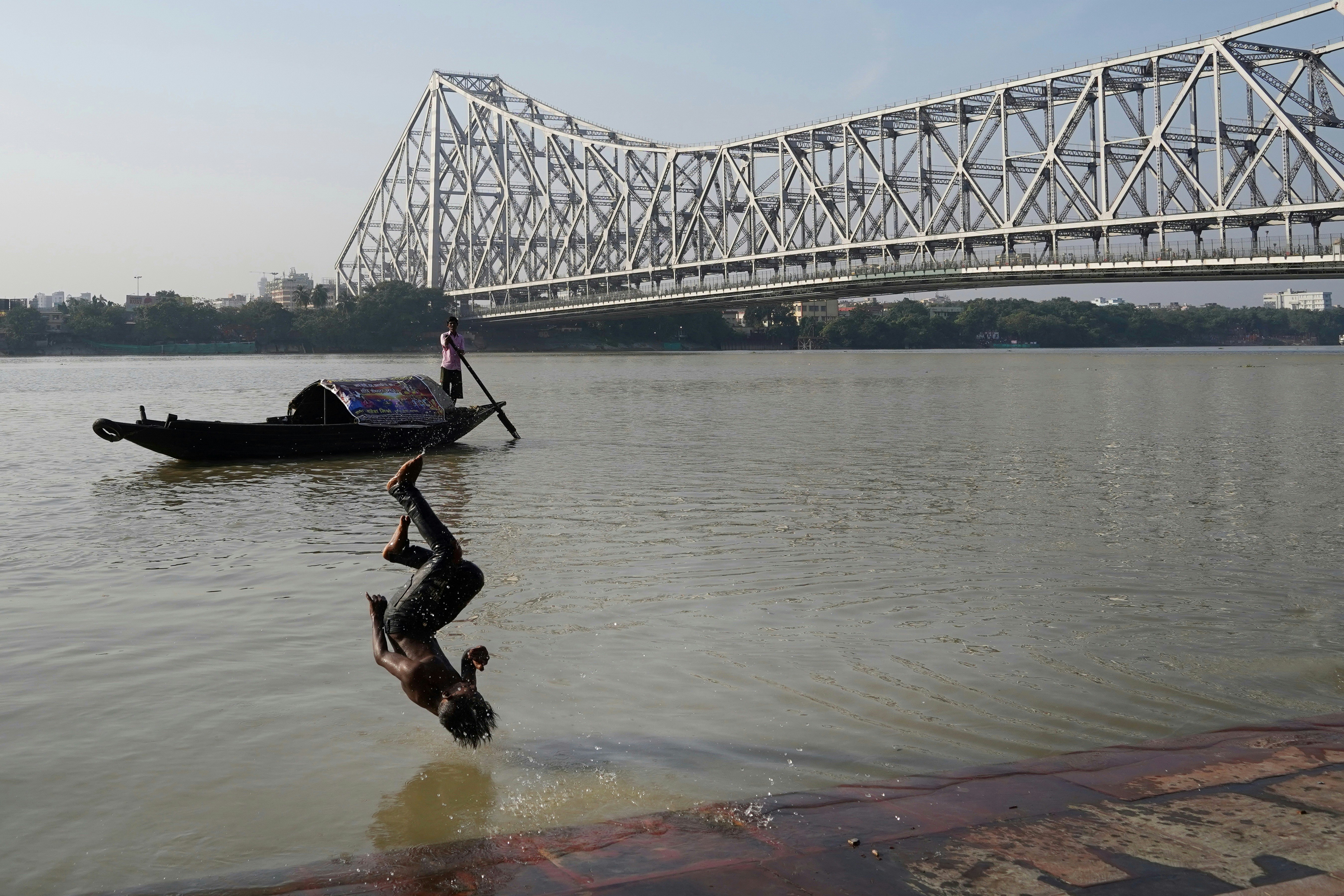 River Runner: A Boatman Against the Steel Horizon