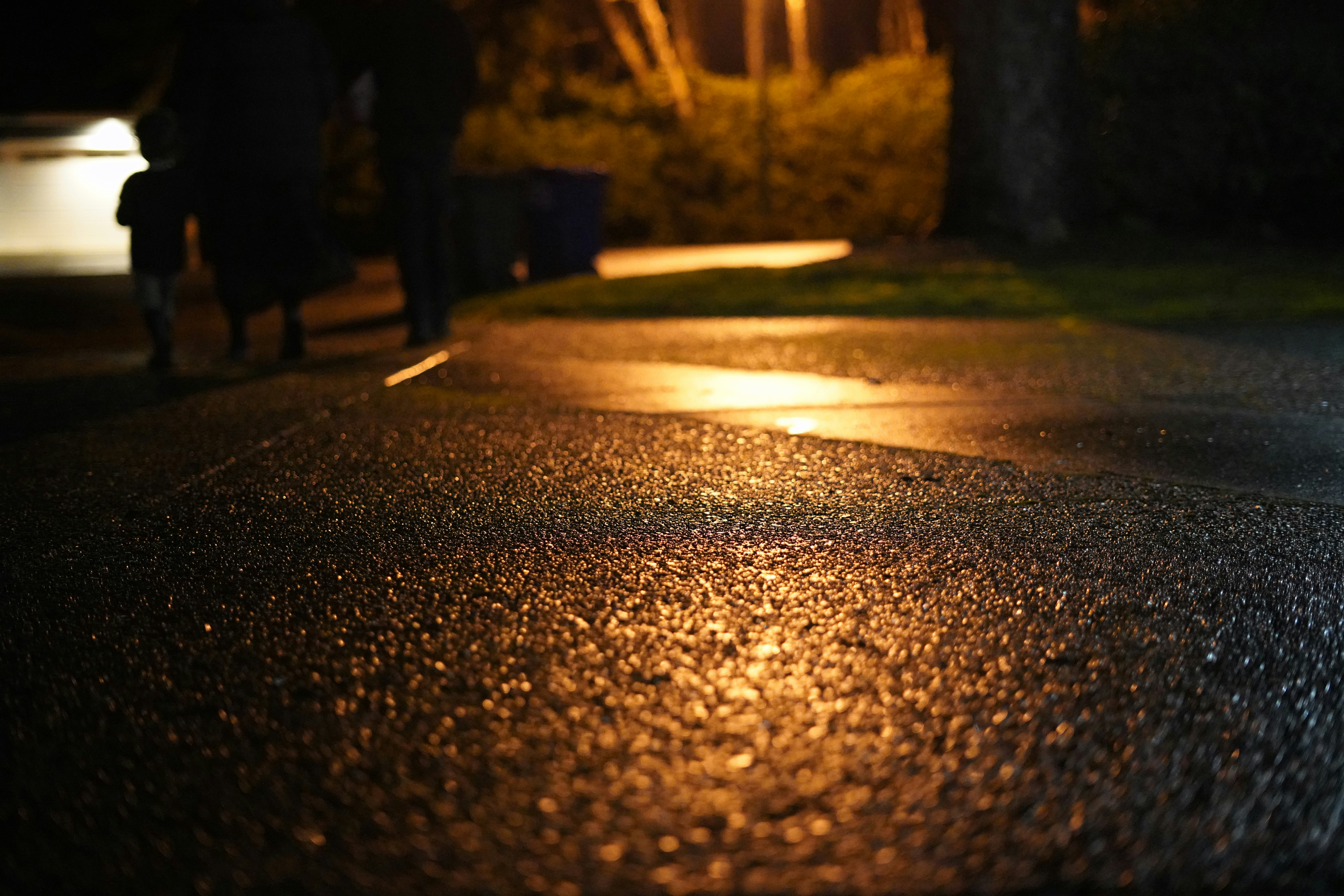 Amber Echoes on a Rain-Slick Street